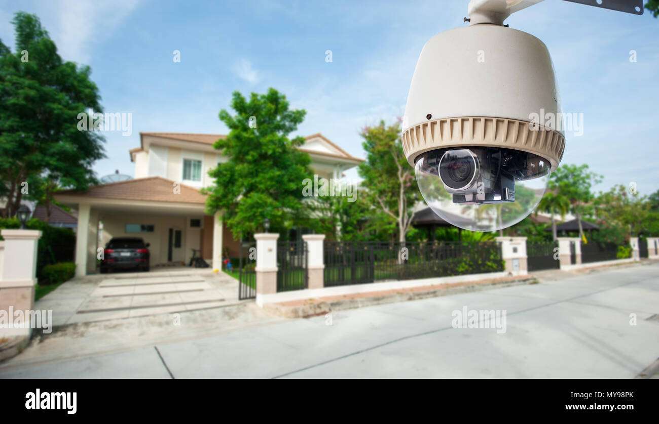 CCTV Camera with house in background Stock Photo - Alamy