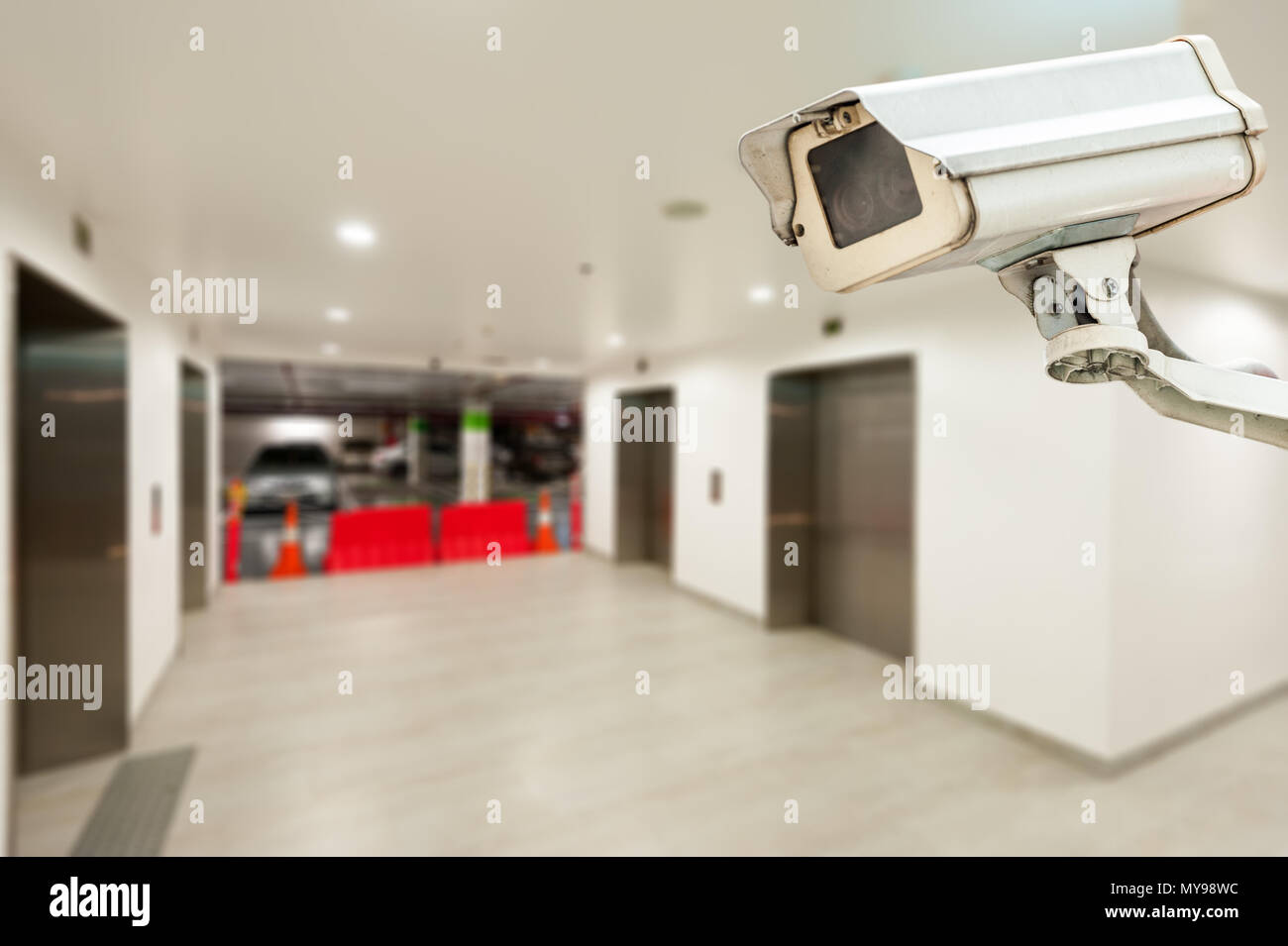 CCTV operating in car park building with elevator Stock Photo - Alamy