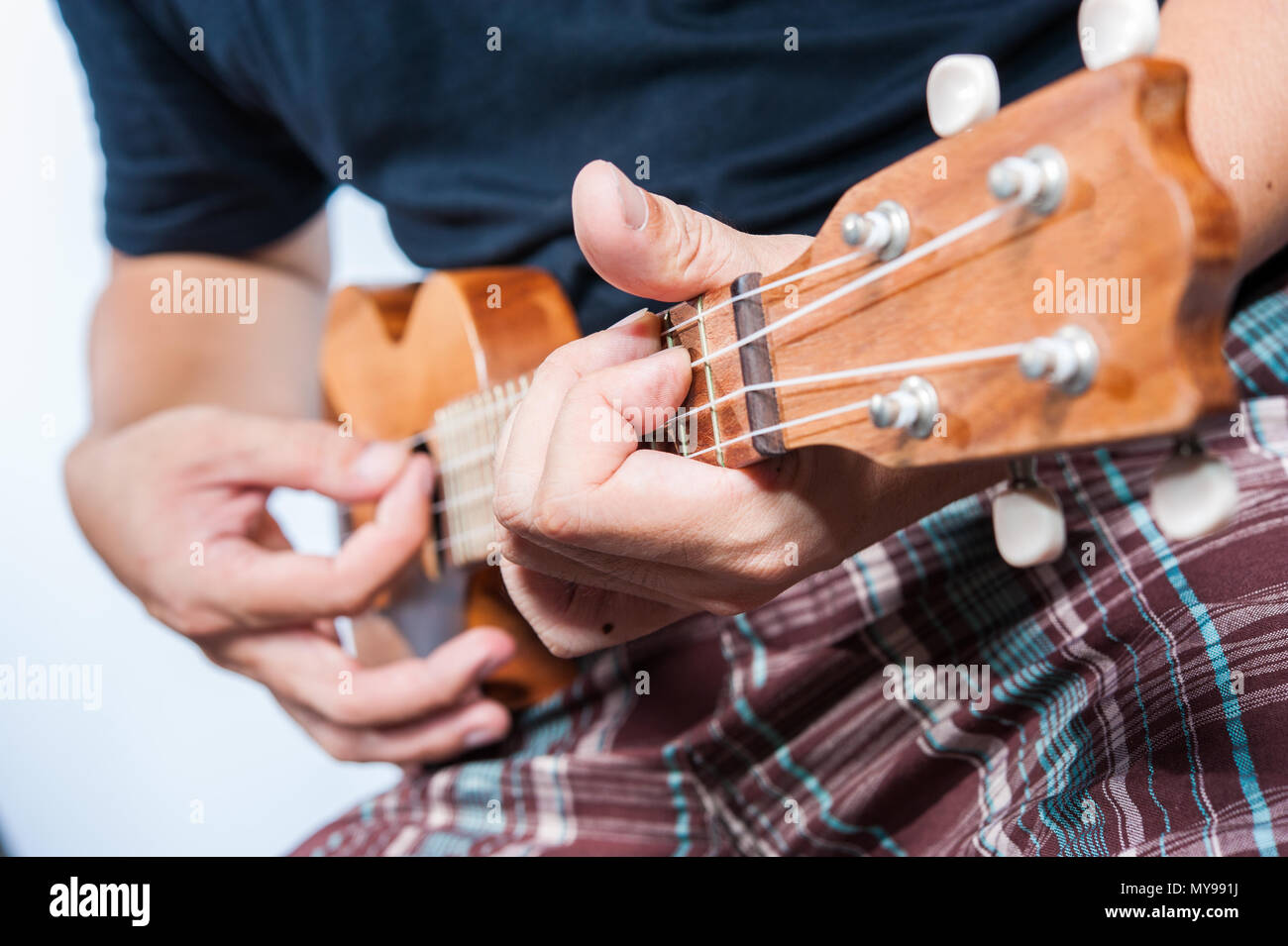 Ukulele chords strings hi-res stock photography and images - Alamy