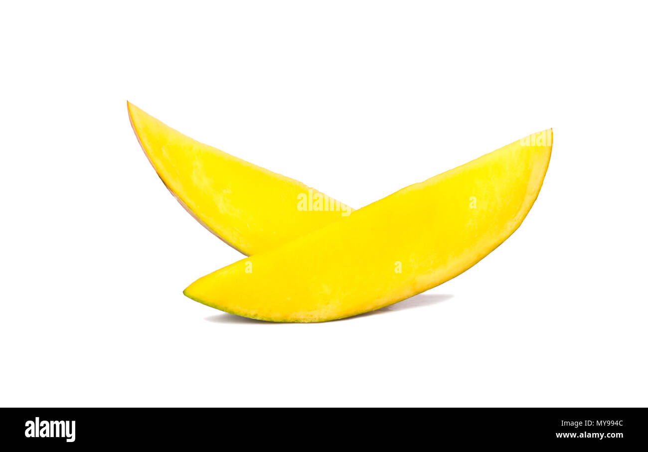 Two crossed slices of mango fruit on a white background Stock Photo - Alamy