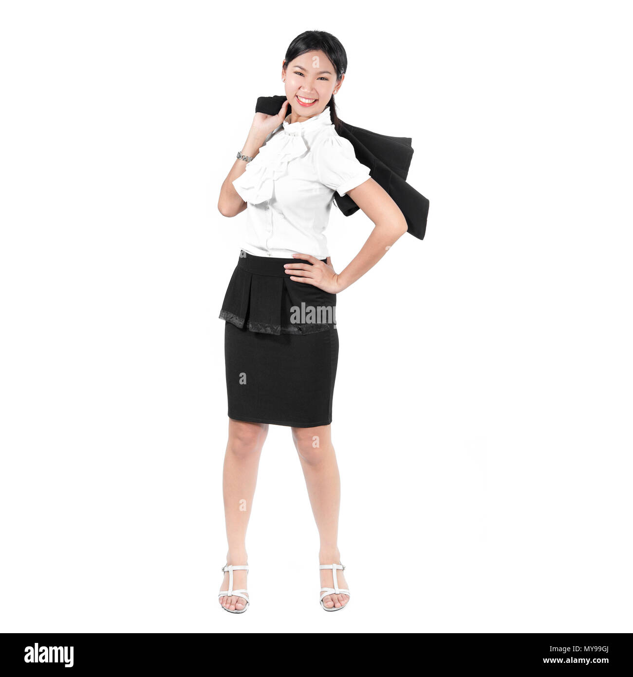 Young business woman hold jacket or suit over shoulder Stock Photo - Alamy