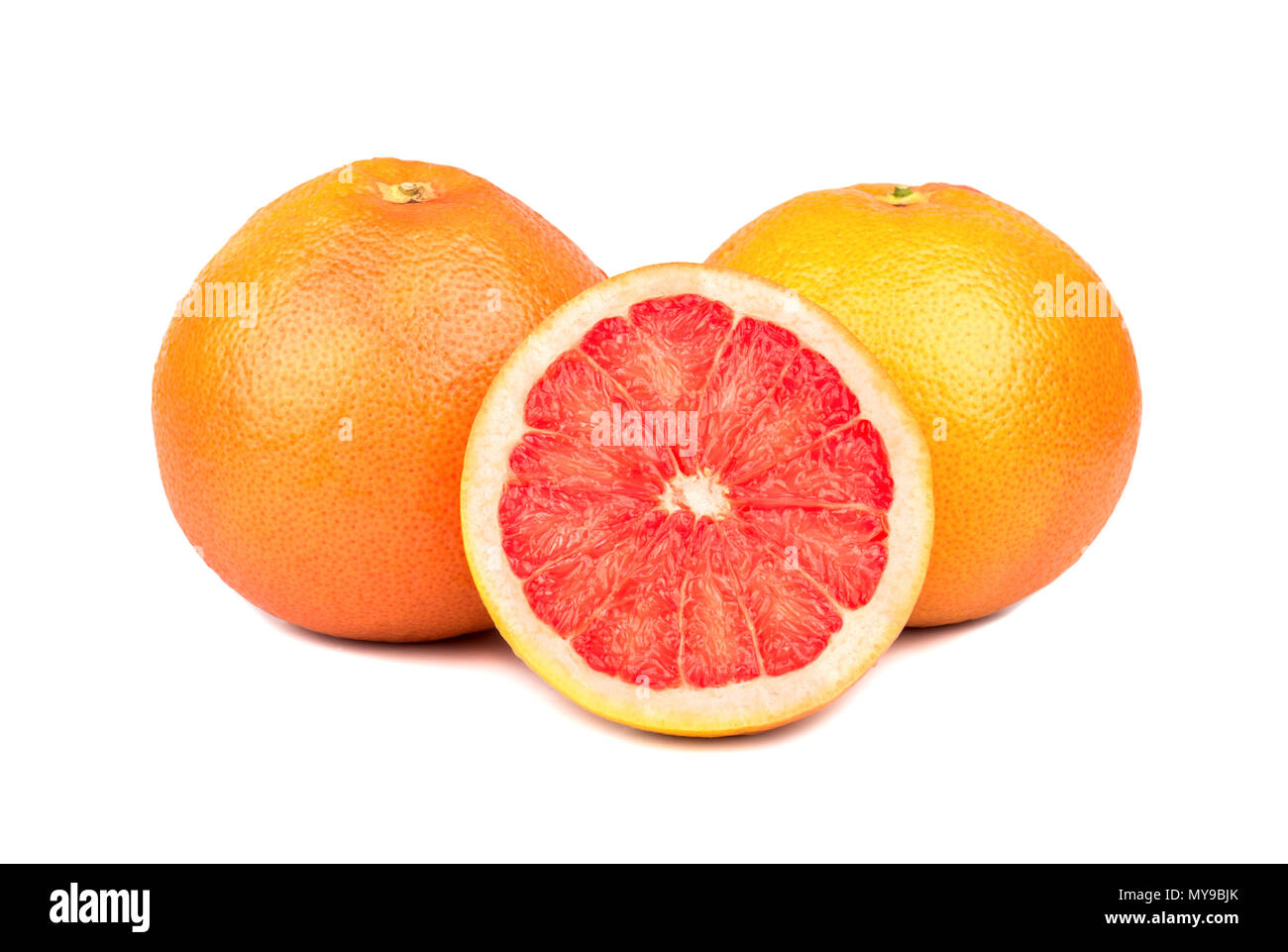 Two grapefruit with juicy half isolated on white background Stock Photo ...