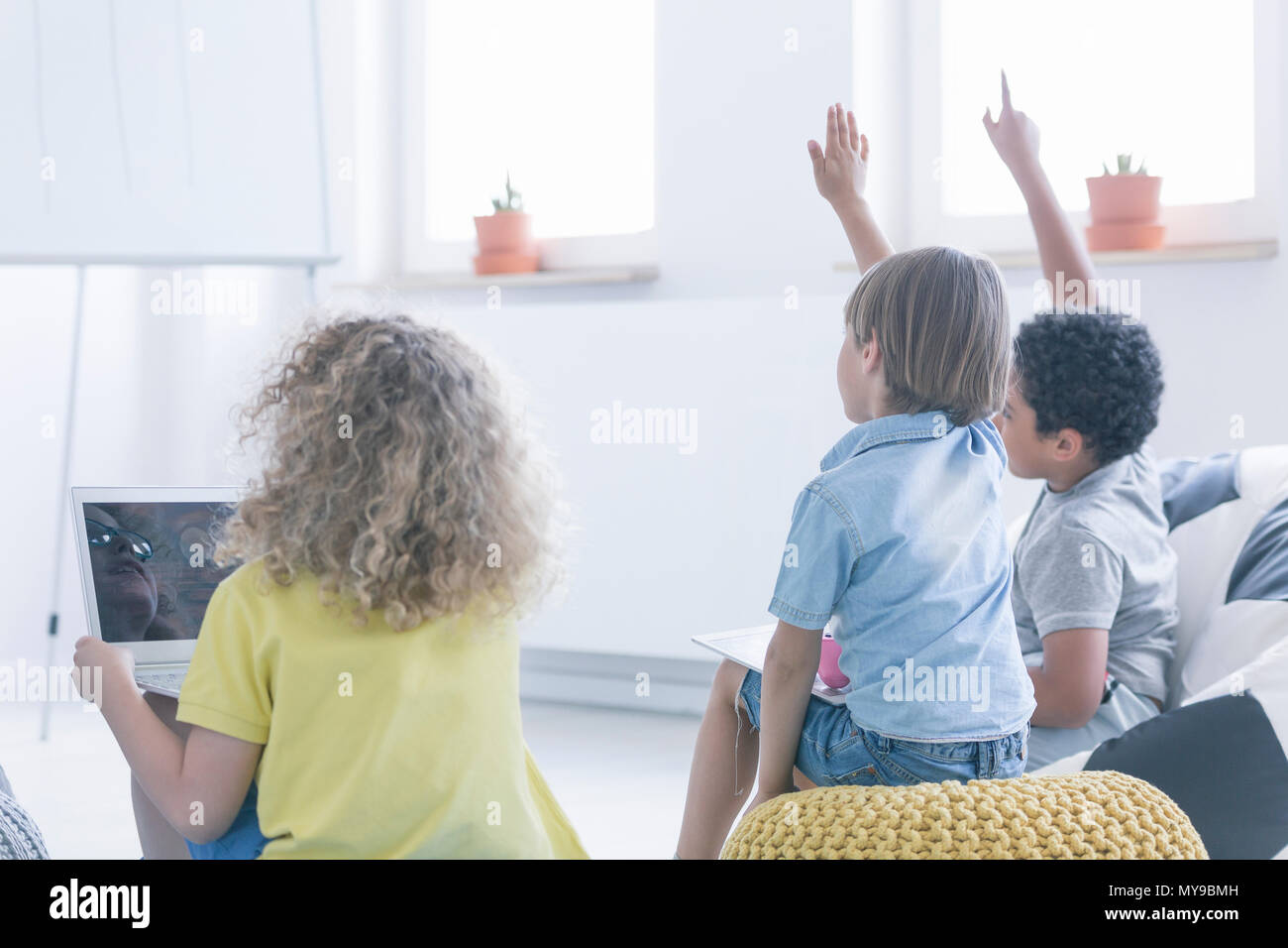 Multicultural school children in classroom hi-res stock photography and ...