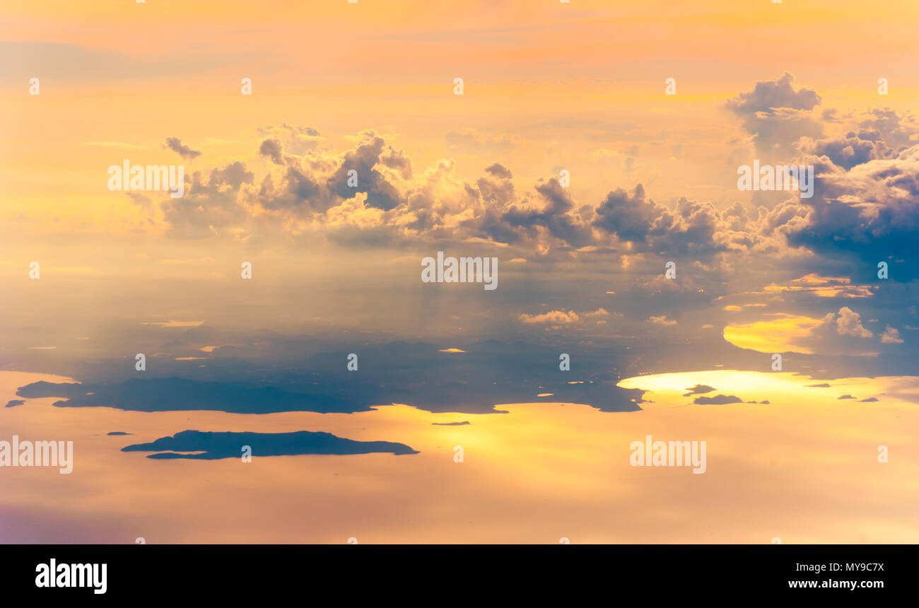 Sunset / sunrise with clouds, light rays and other atmospheric effect ...