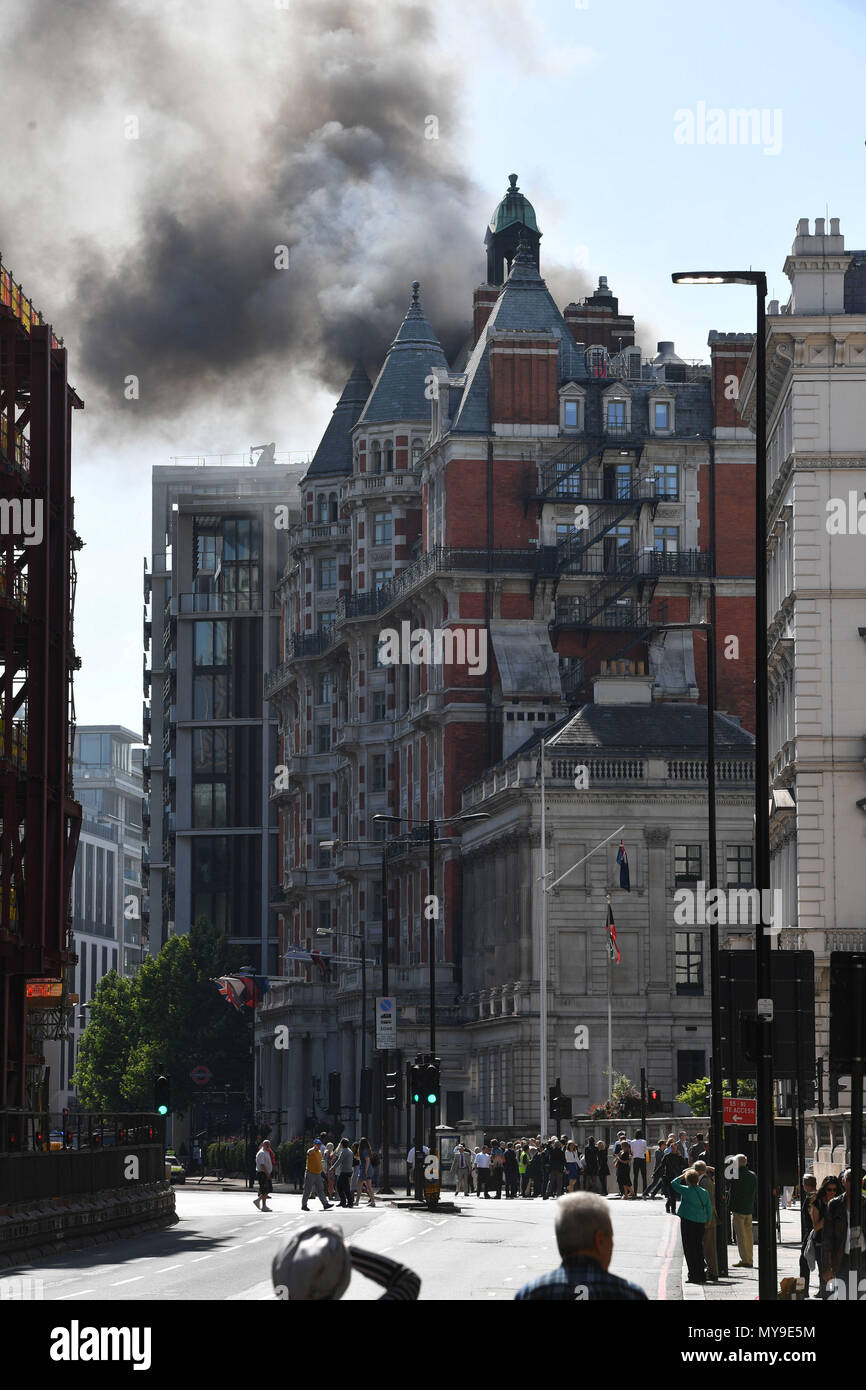 Smoke rising from a building in Knightsbridge, central London, as ...