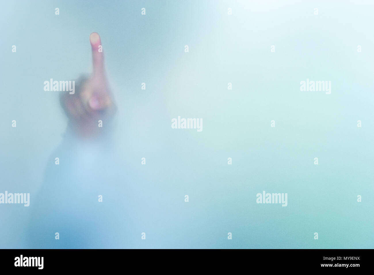 hand writing on blurred glass wall, abstract background with space ...
