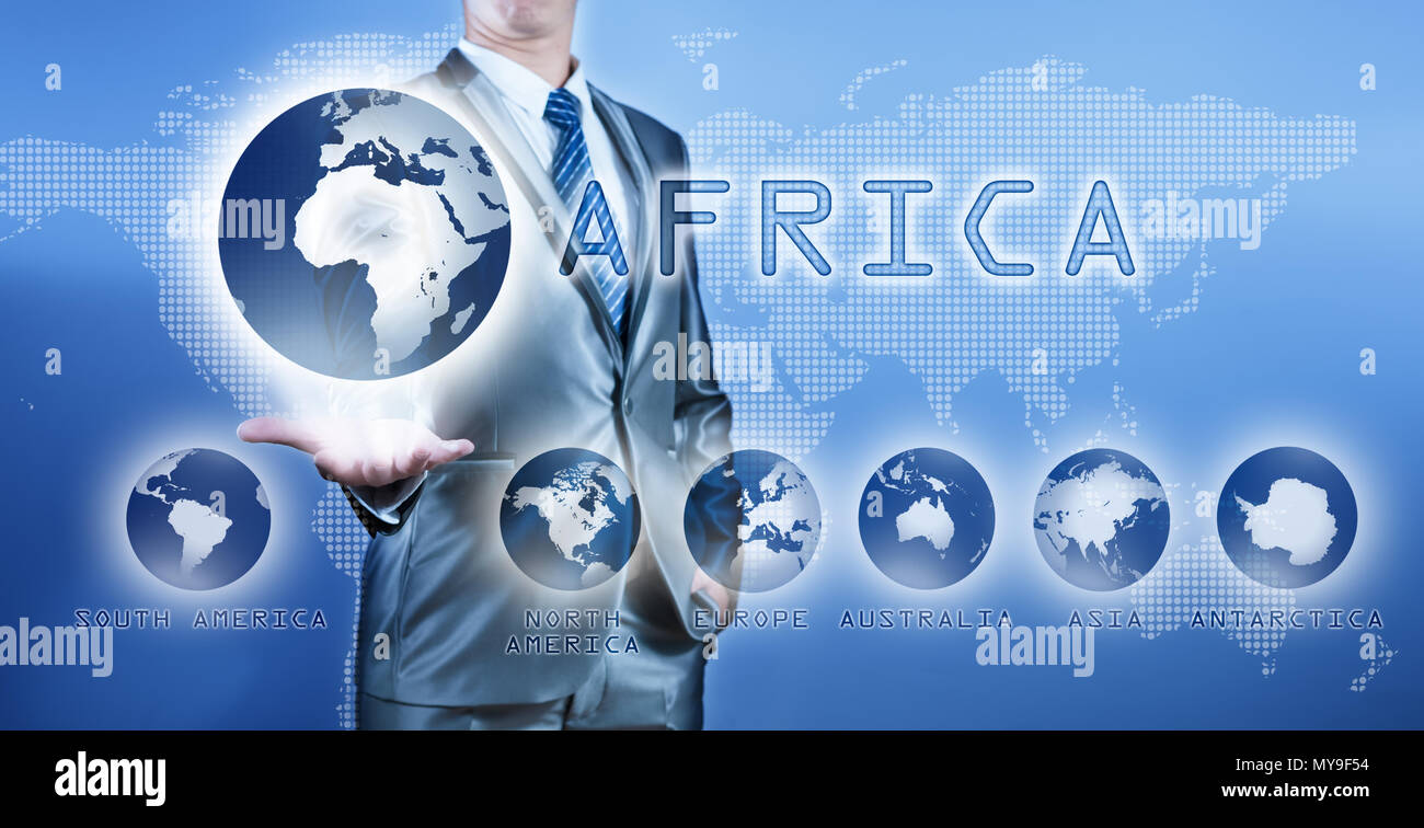 Businessman choosing africa continent on virtual digital screen ...