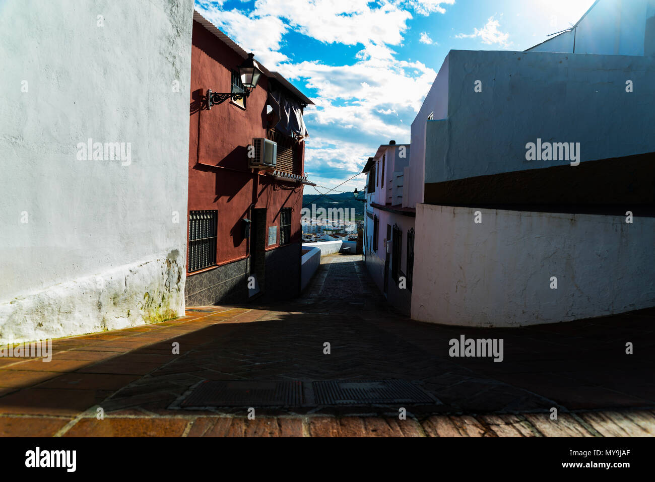 beautiful, picturesque street, narrow road, white facades of buildings, Spanish architecture ...