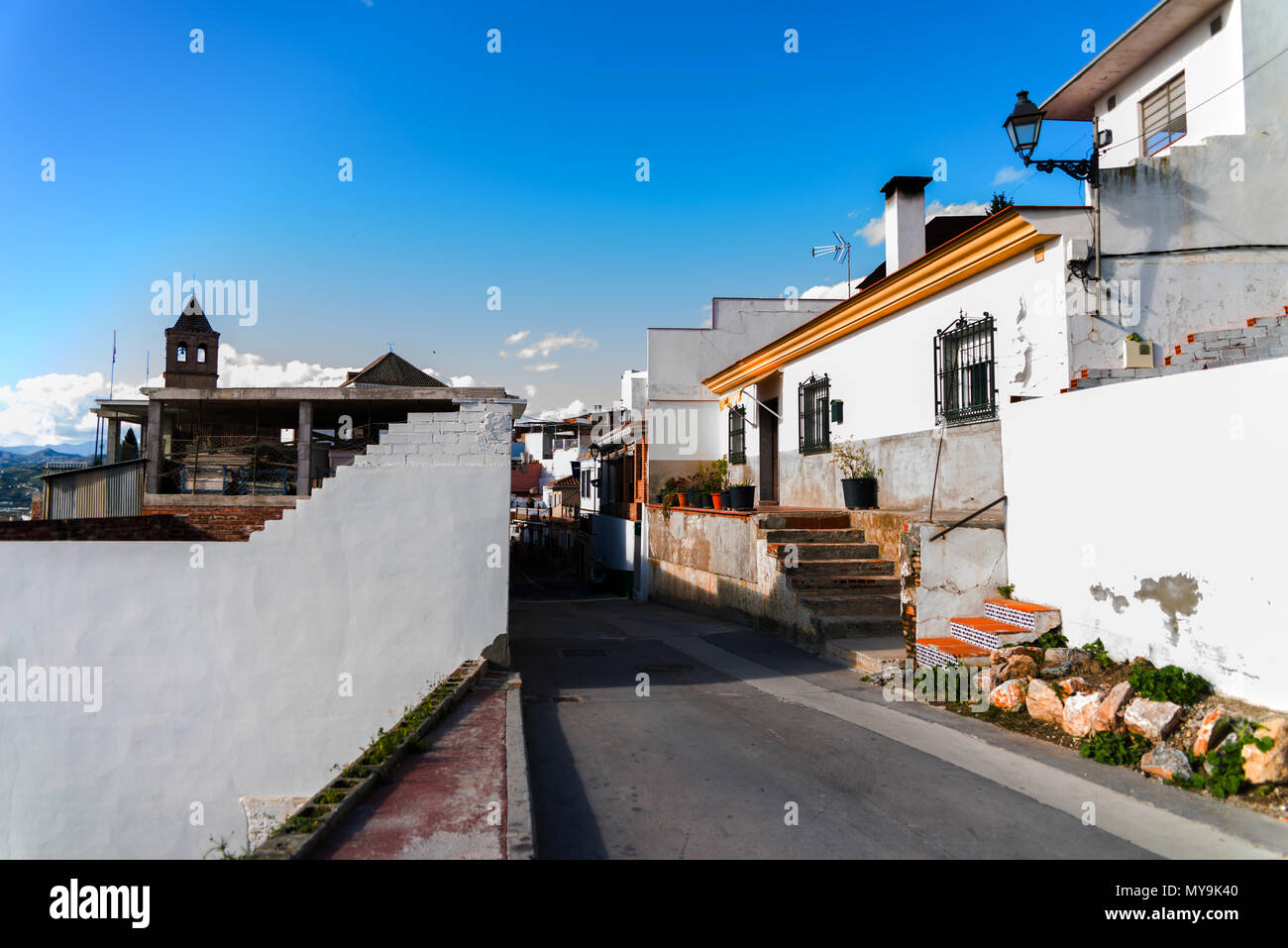 beautiful, picturesque street, narrow road, white facades of buildings ...