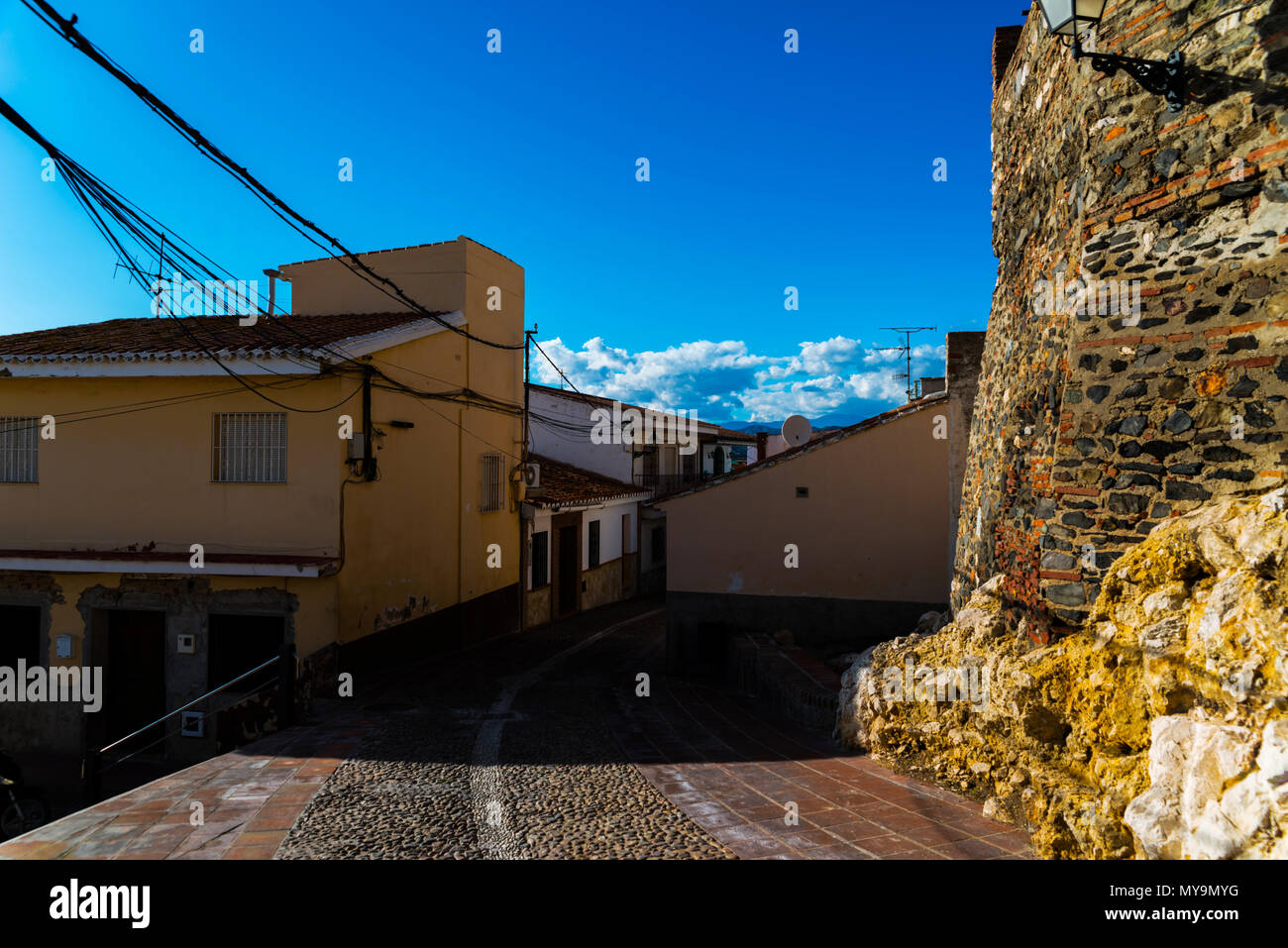 beautiful, picturesque street, narrow road, white facades of buildings ...