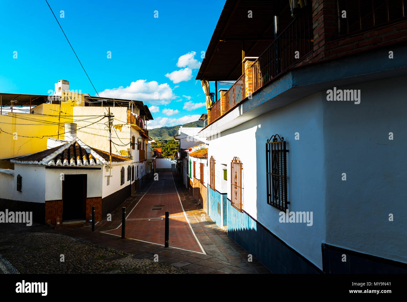 beautiful, picturesque street, narrow road, white facades of buildings ...