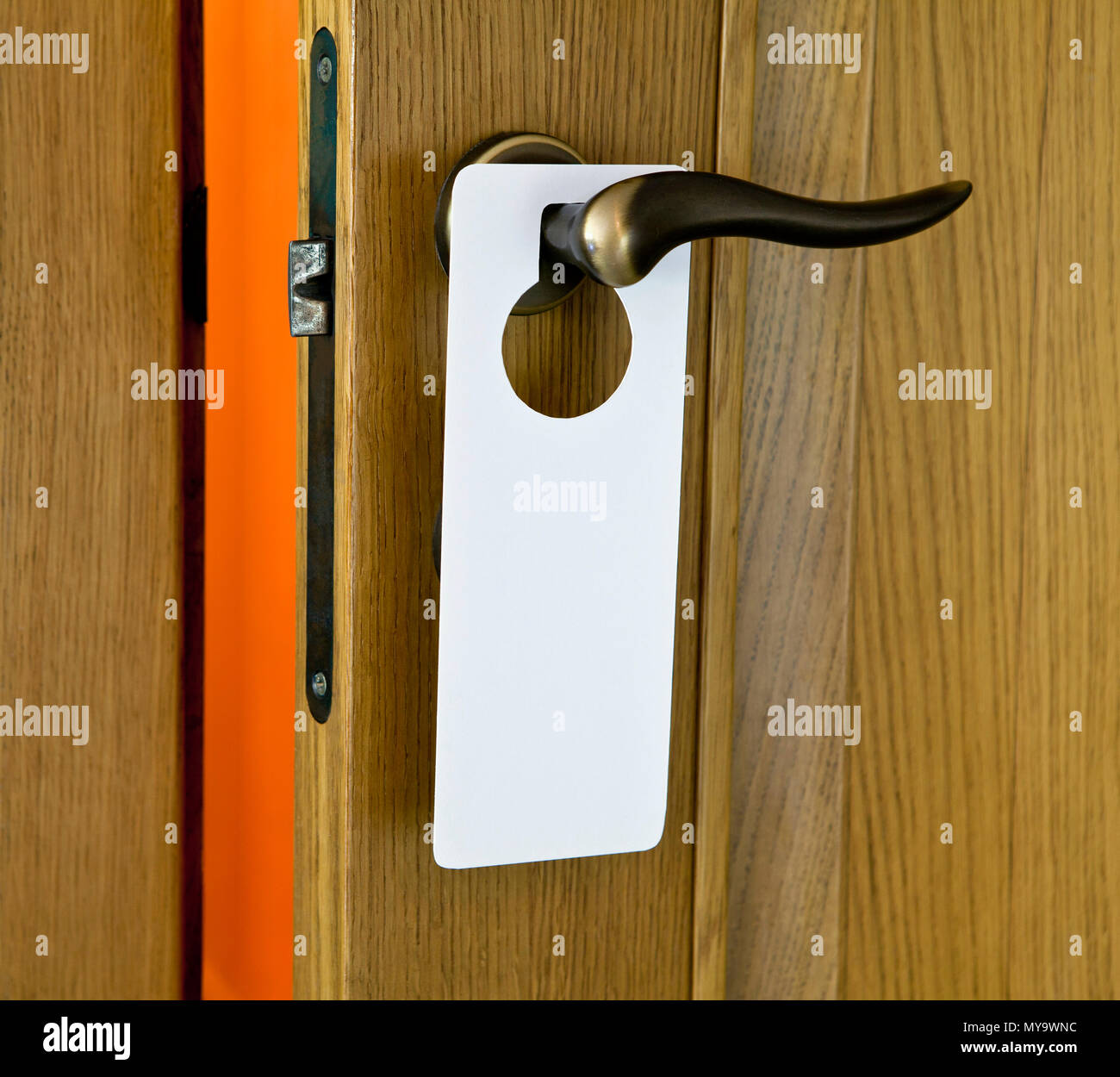 Door of hotel room with empty sign please do not disturb Stock Photo ...