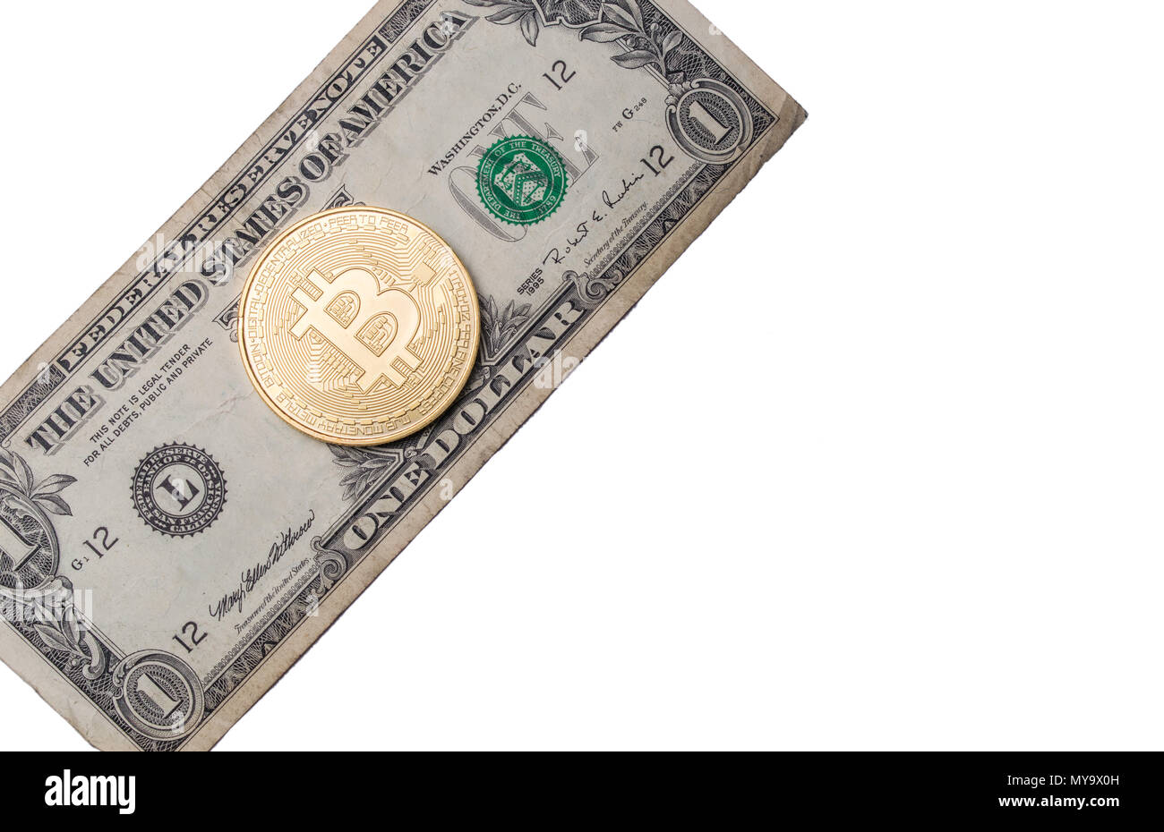 Bitcoin covers a single One Dollar bill, with copy space, isolated on ...