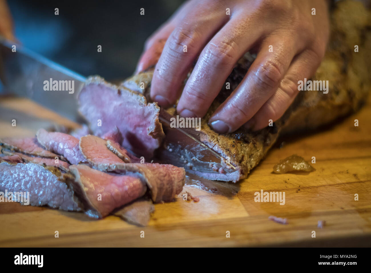 Cutting a fresh meat loaf Stock Photo - Alamy