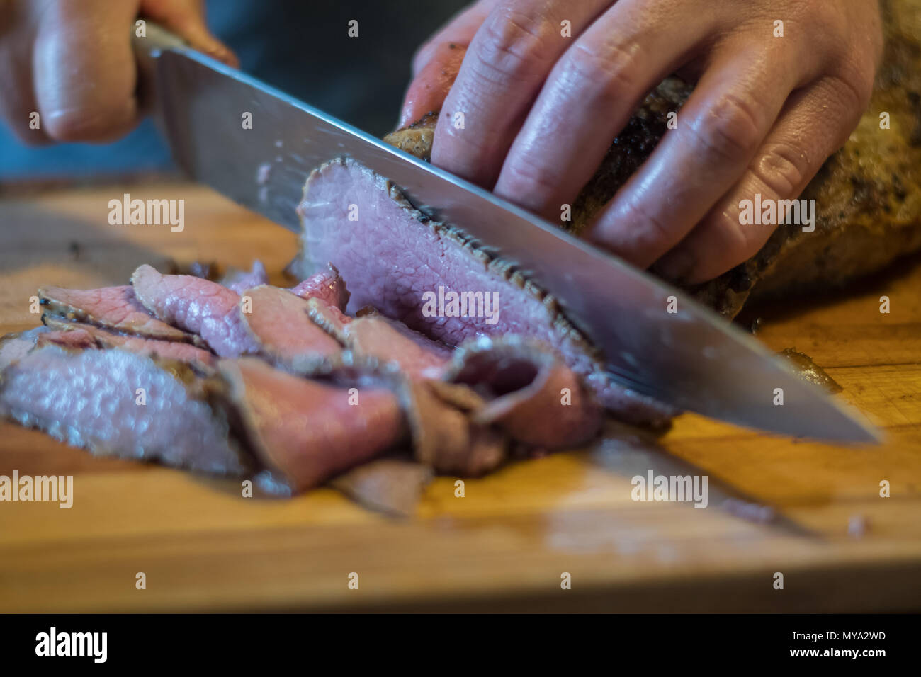 Cutting a fresh meat loaf Stock Photo - Alamy