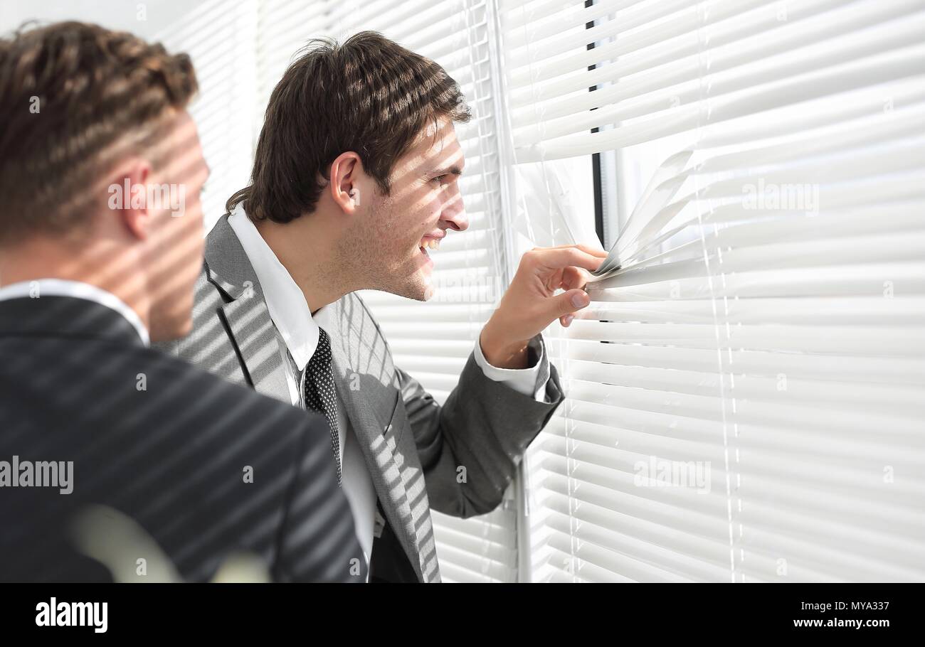 business people look in the window office Stock Photo - Alamy