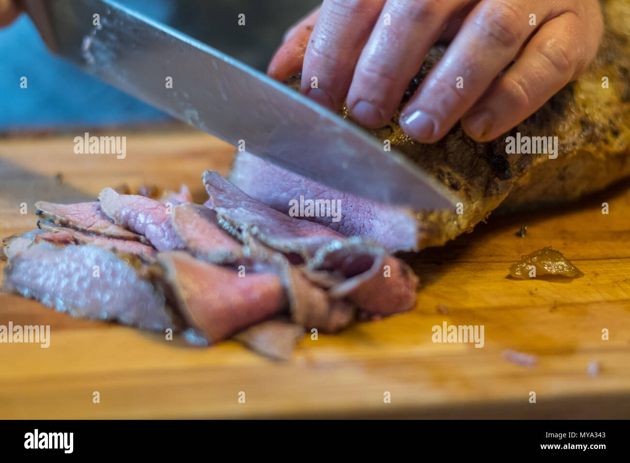 Cutting a fresh meat loaf Stock Photo - Alamy