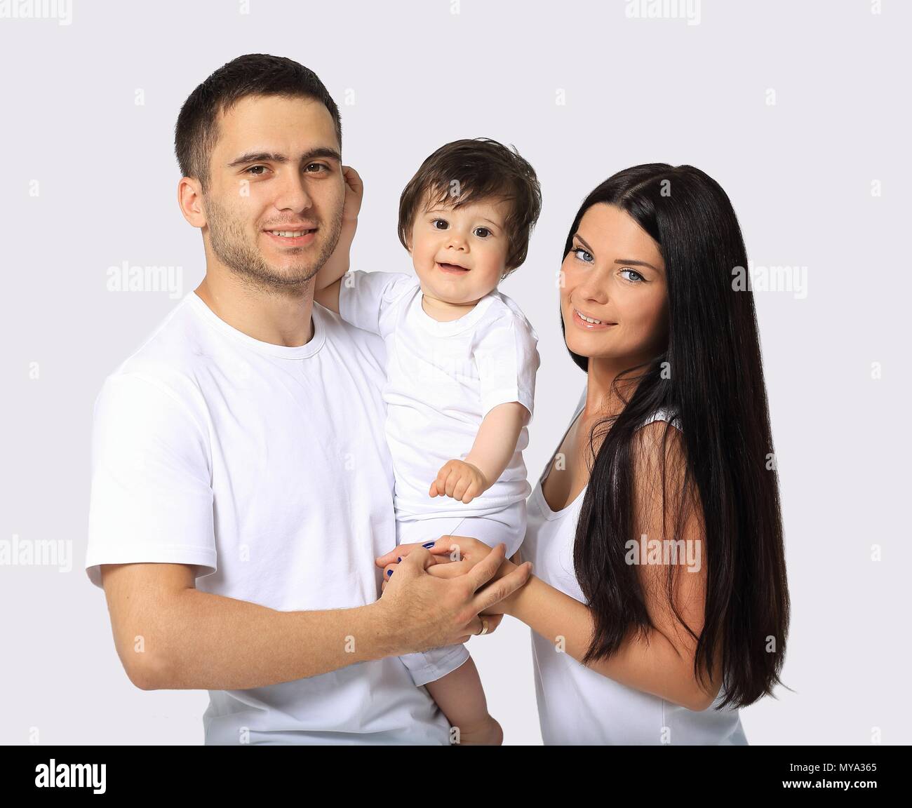 Happy family with newborn baby on a white background Stock Photo - Alamy