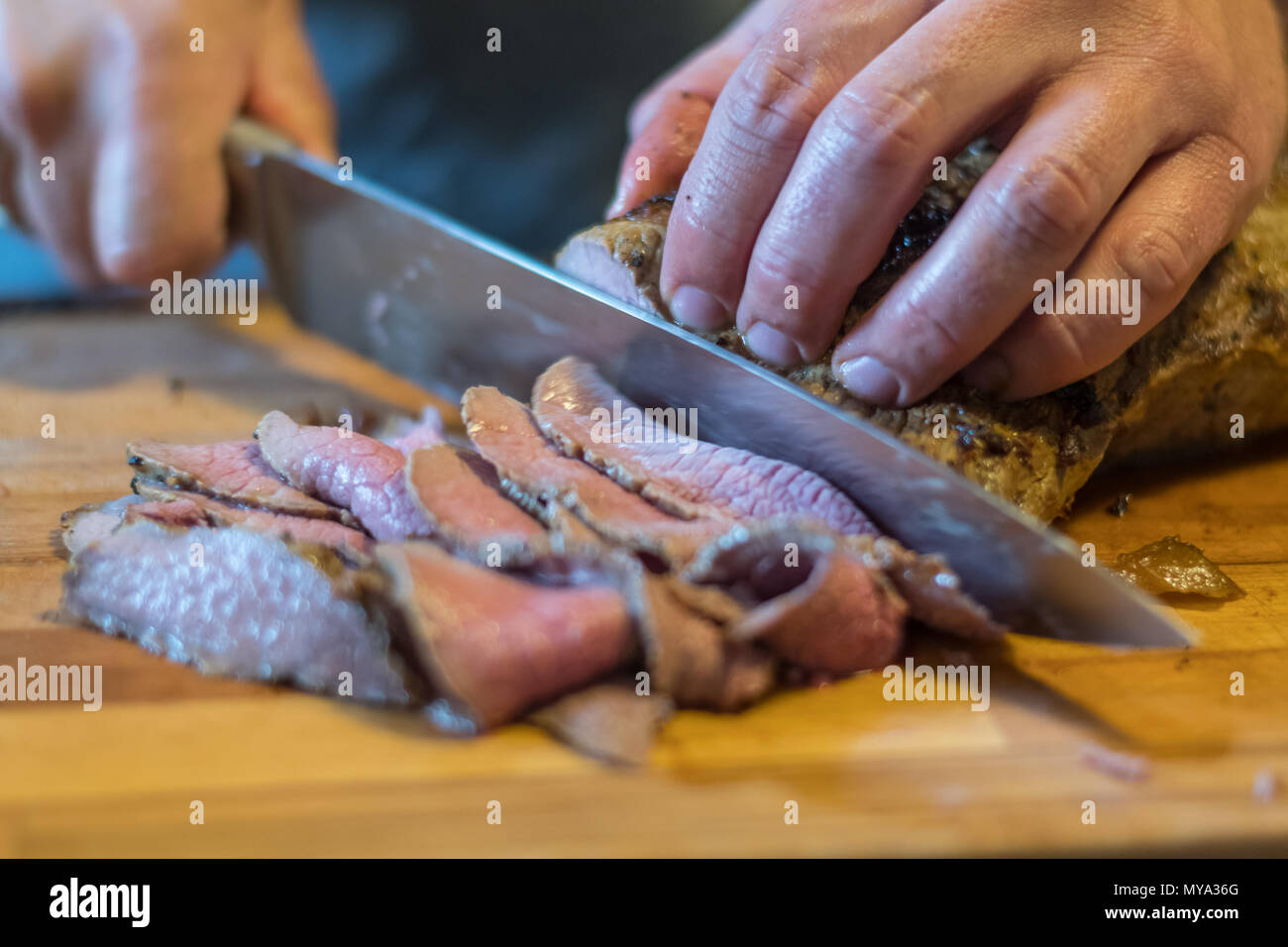 Cutting a fresh meat loaf Stock Photo - Alamy