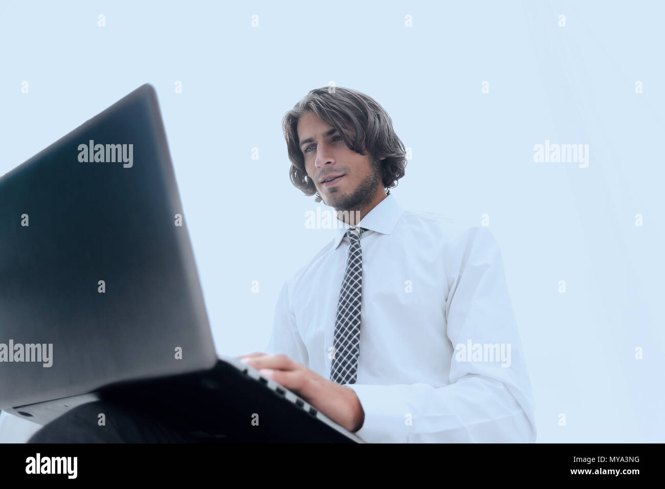 closeup.a successful employee working with a laptop Stock Photo - Alamy