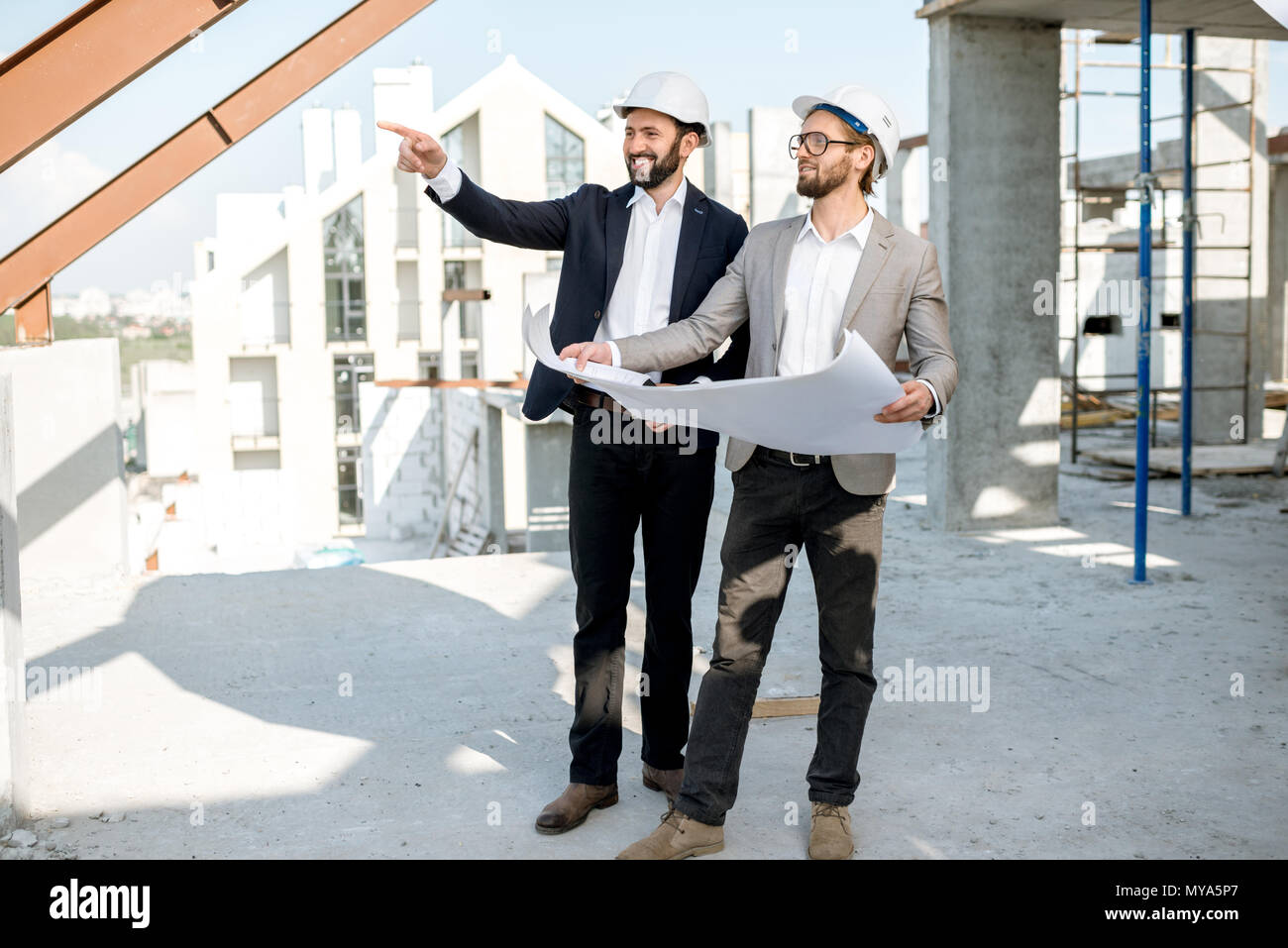 Business people on the structure Stock Photo - Alamy