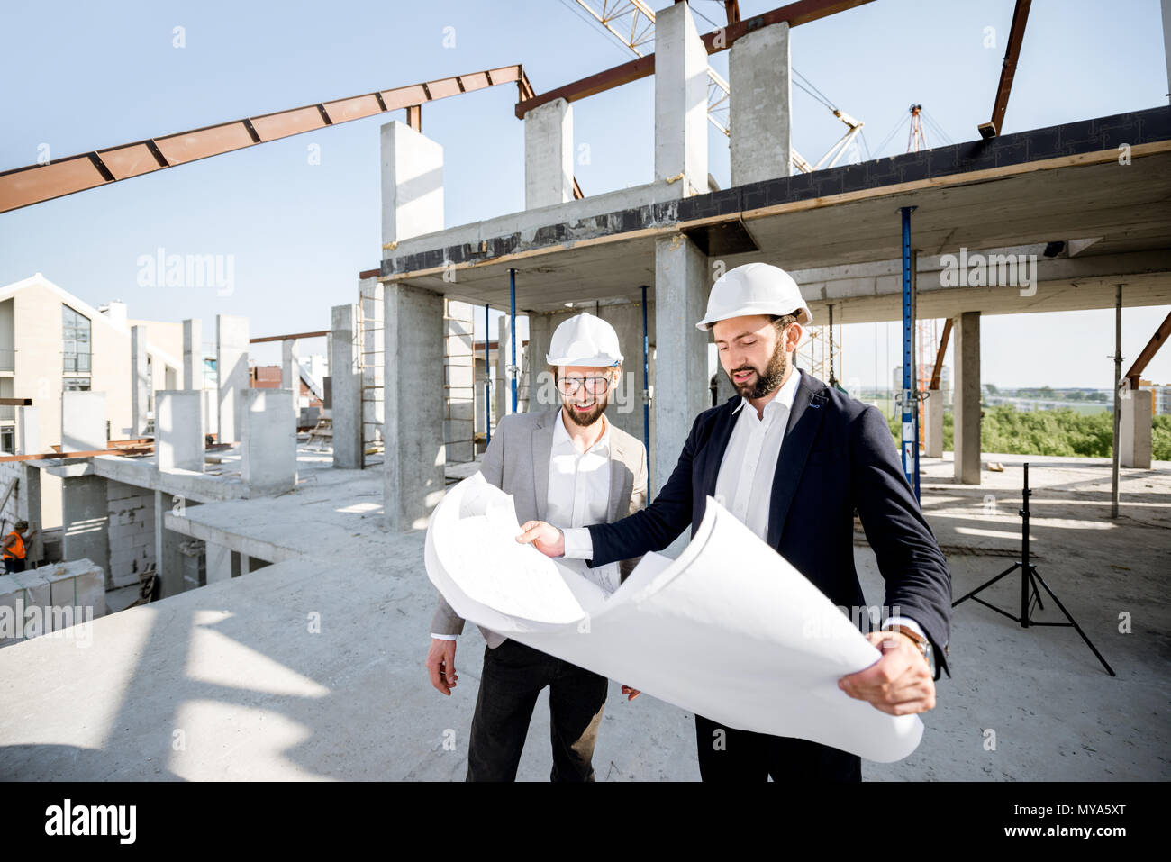 Business people on the structure Stock Photo - Alamy