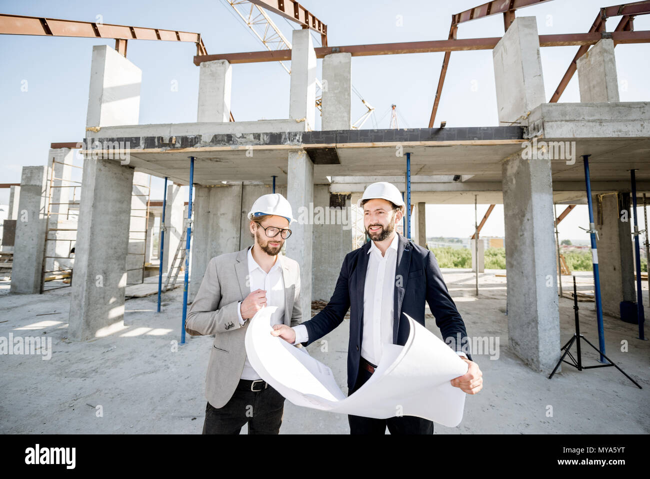 Business people on the structure Stock Photo - Alamy