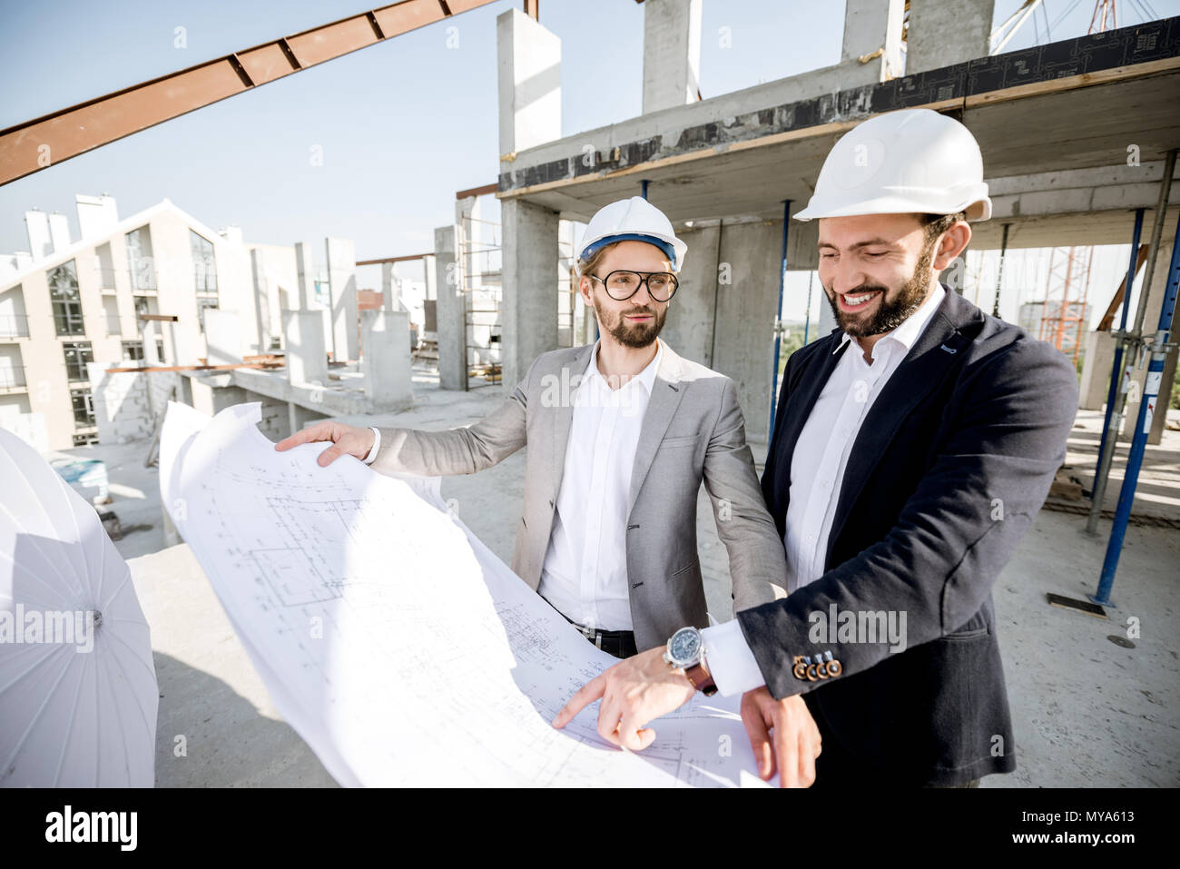 Business people on the structure Stock Photo - Alamy