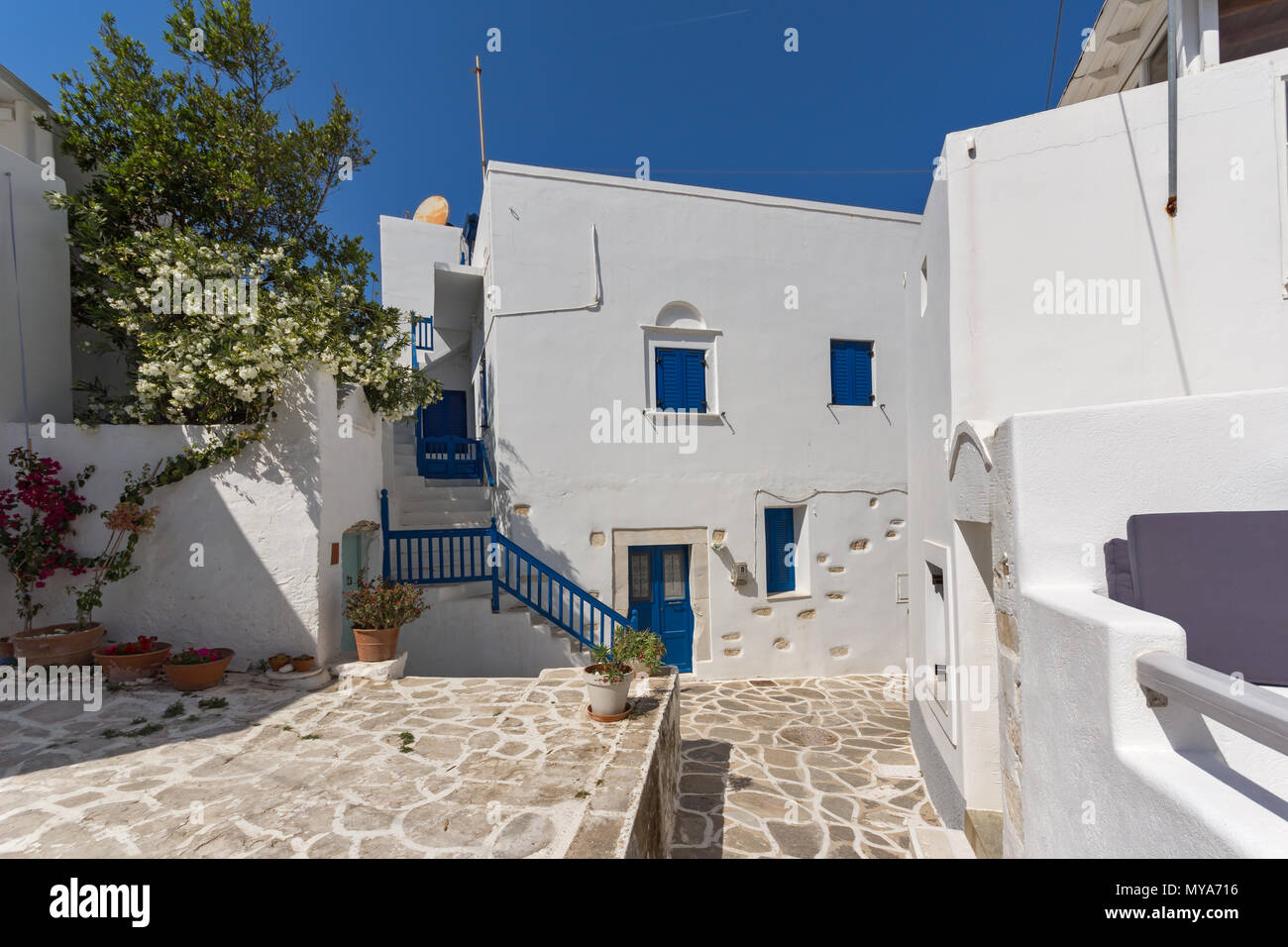 Typical street in town of Parakia, Paros island, Cyclades, Greece Stock ...