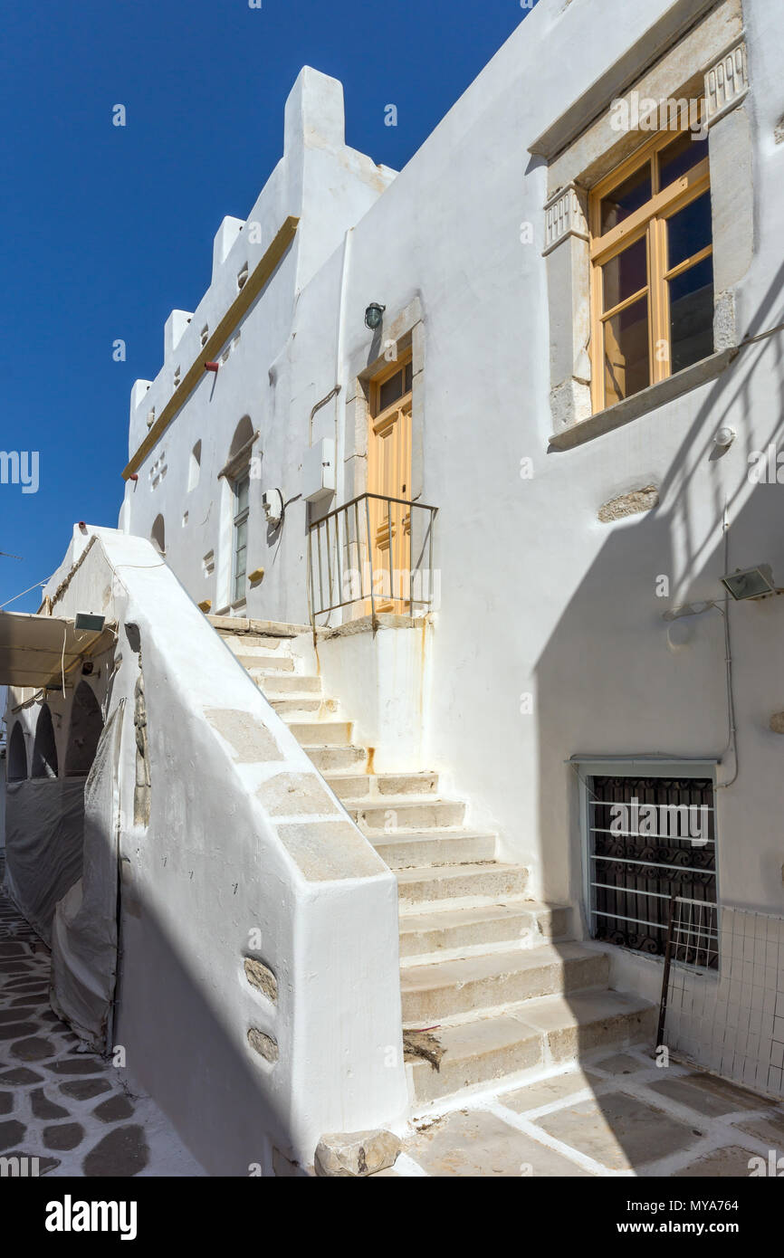white houses with flowers in town of Parakia, Paros island, Cyclades ...