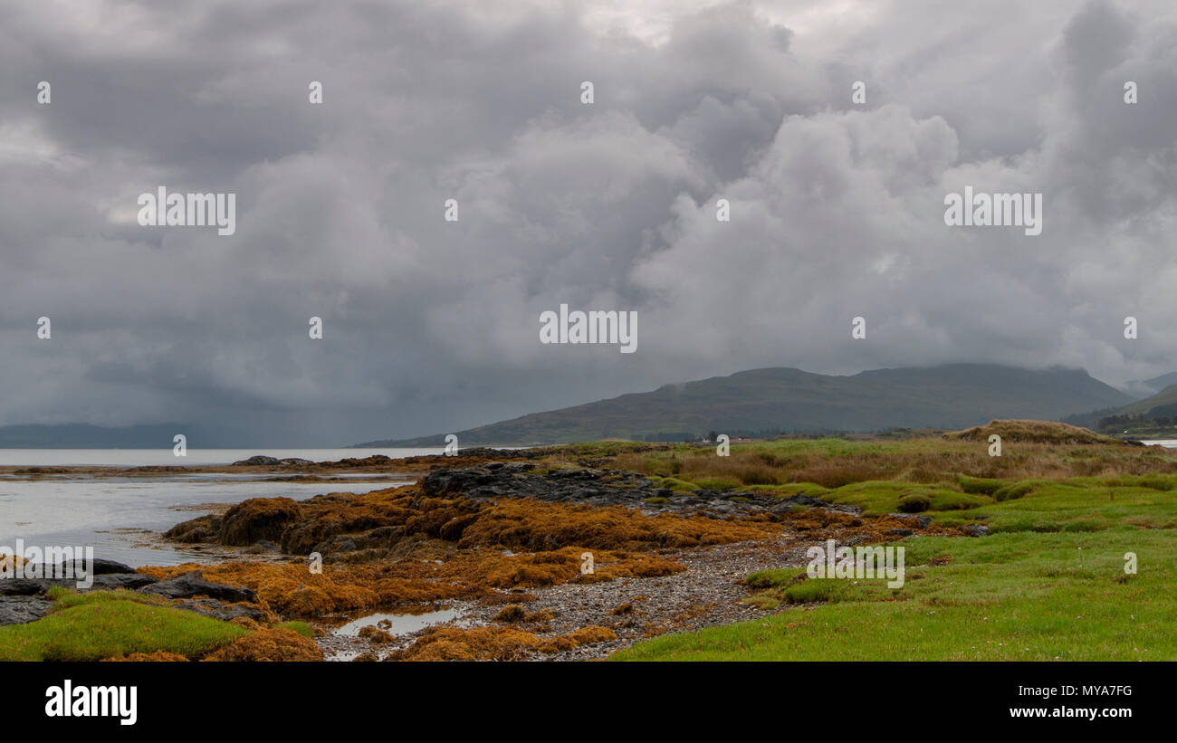 View of the Sound of Mull on an early autumn morning with gathering and ...