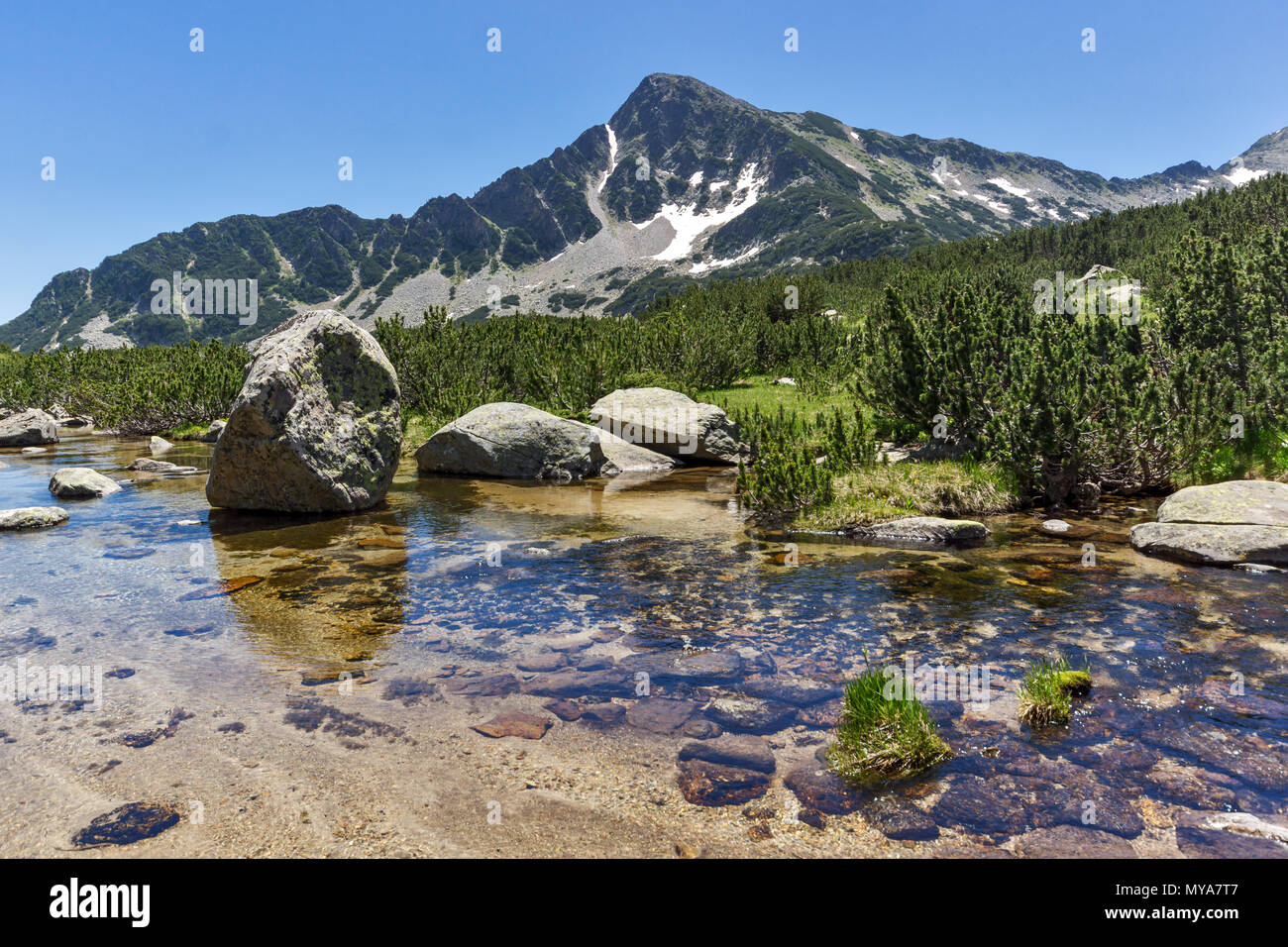 Landscape with Stones in the water of Banski lakes and Sivrya peak ...
