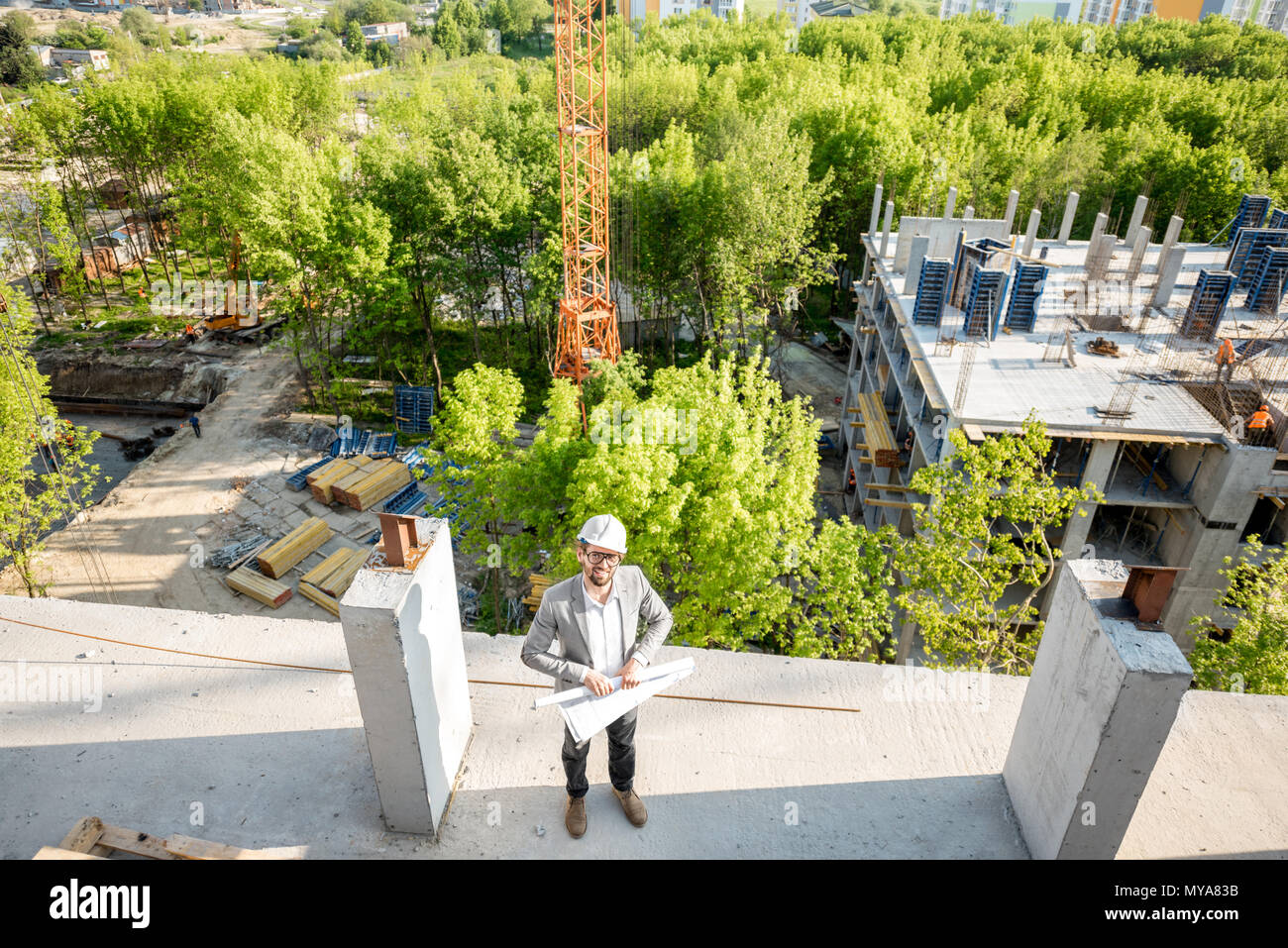 Construction site with engineer Stock Photo - Alamy