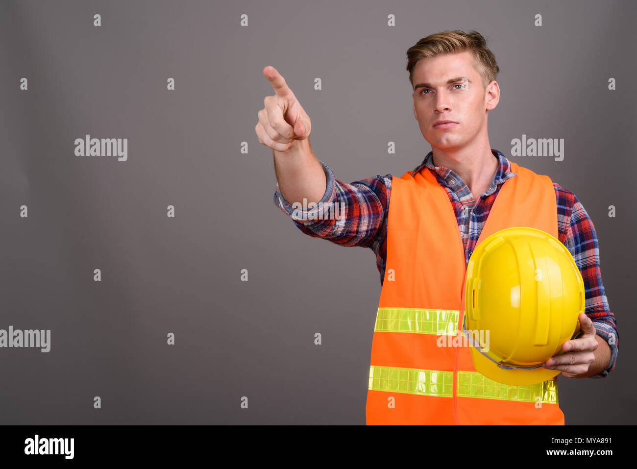 Construction worker pointing copy hi-res stock photography and images ...