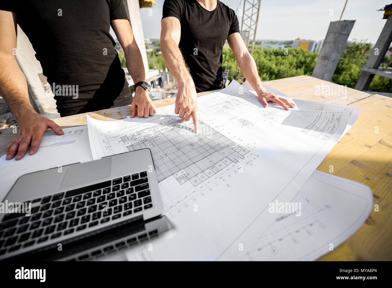 Working at the construction site outdoors Stock Photo - Alamy