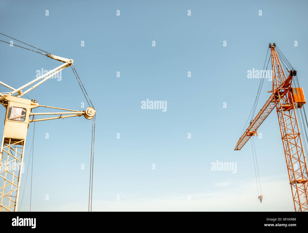Old building cranes Stock Photo - Alamy