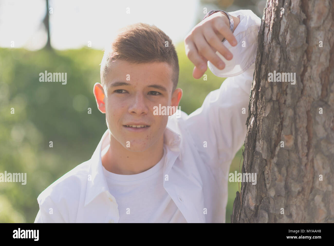 Portrait of Handsome teenage boy outdoors Stock Photo - Alamy