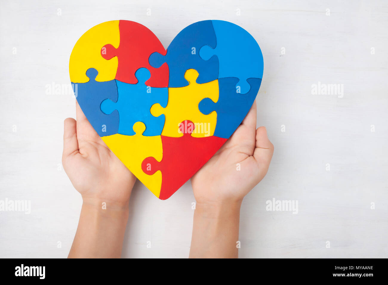 World Autism Awareness day, mental health care concept with puzzle or ...