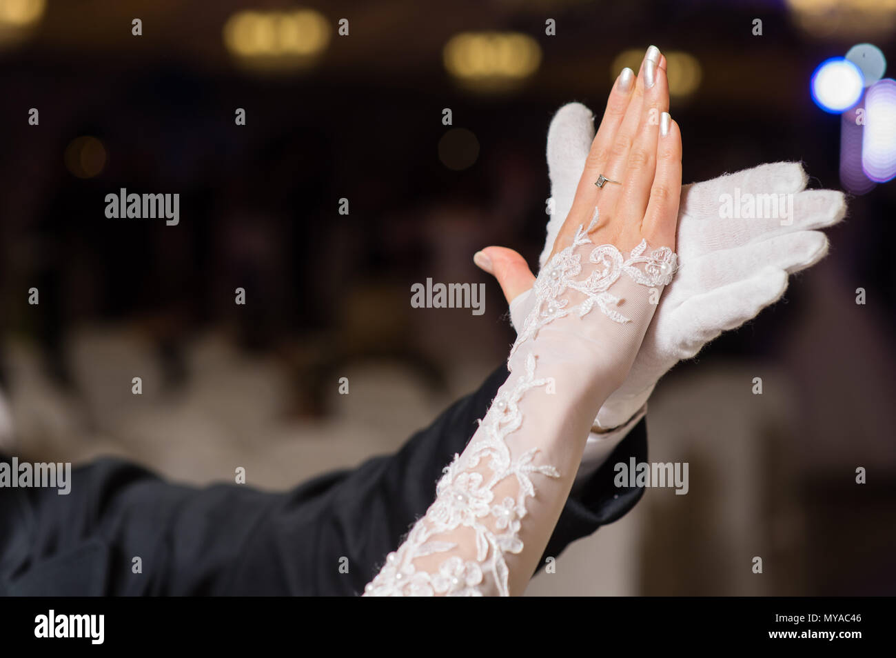 Hands of dancing waltz couple Stock Photo - Alamy