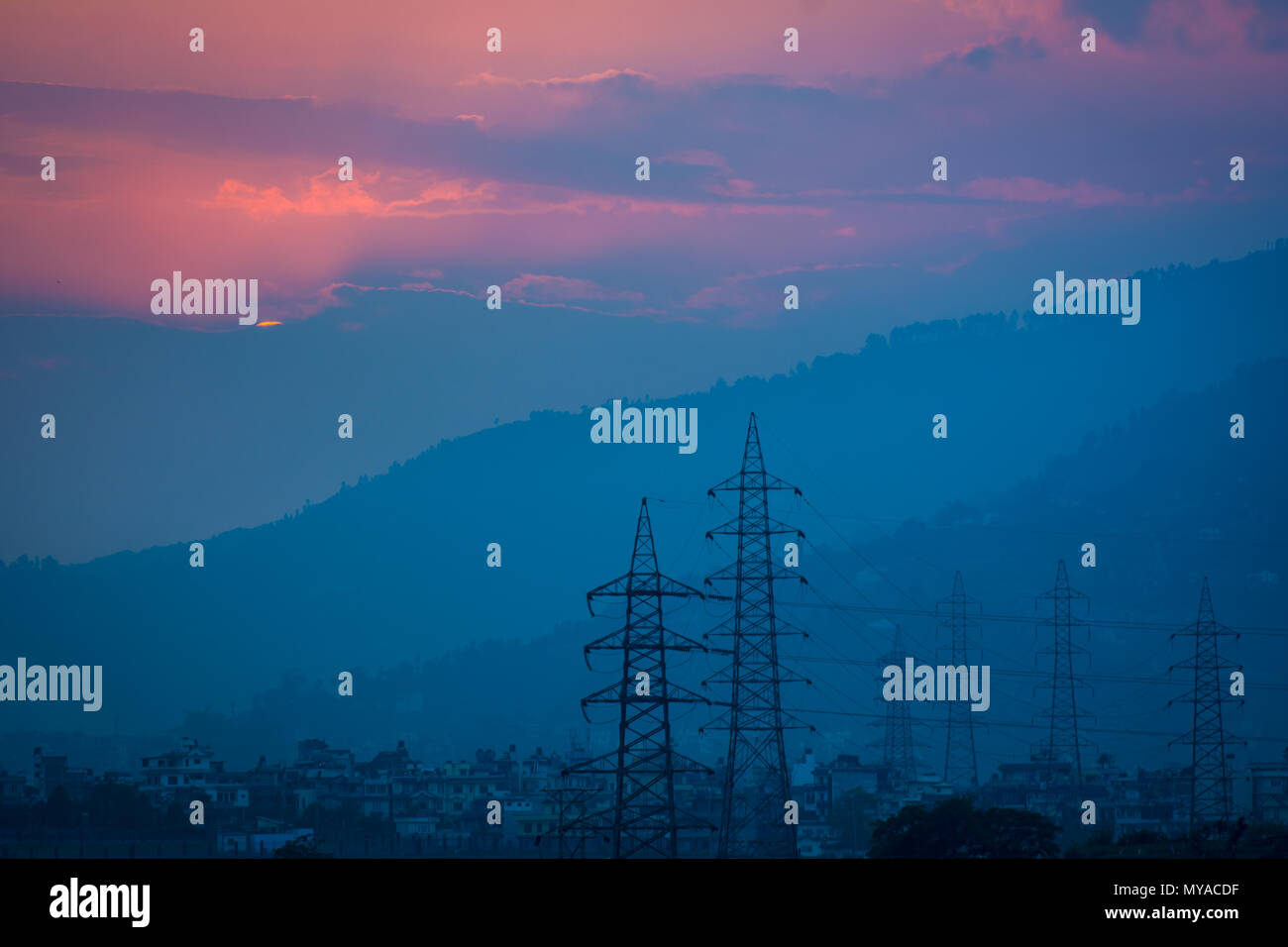 Silhouette Of Power Grid and Dramatic Sunset Sky Stock Photo - Alamy