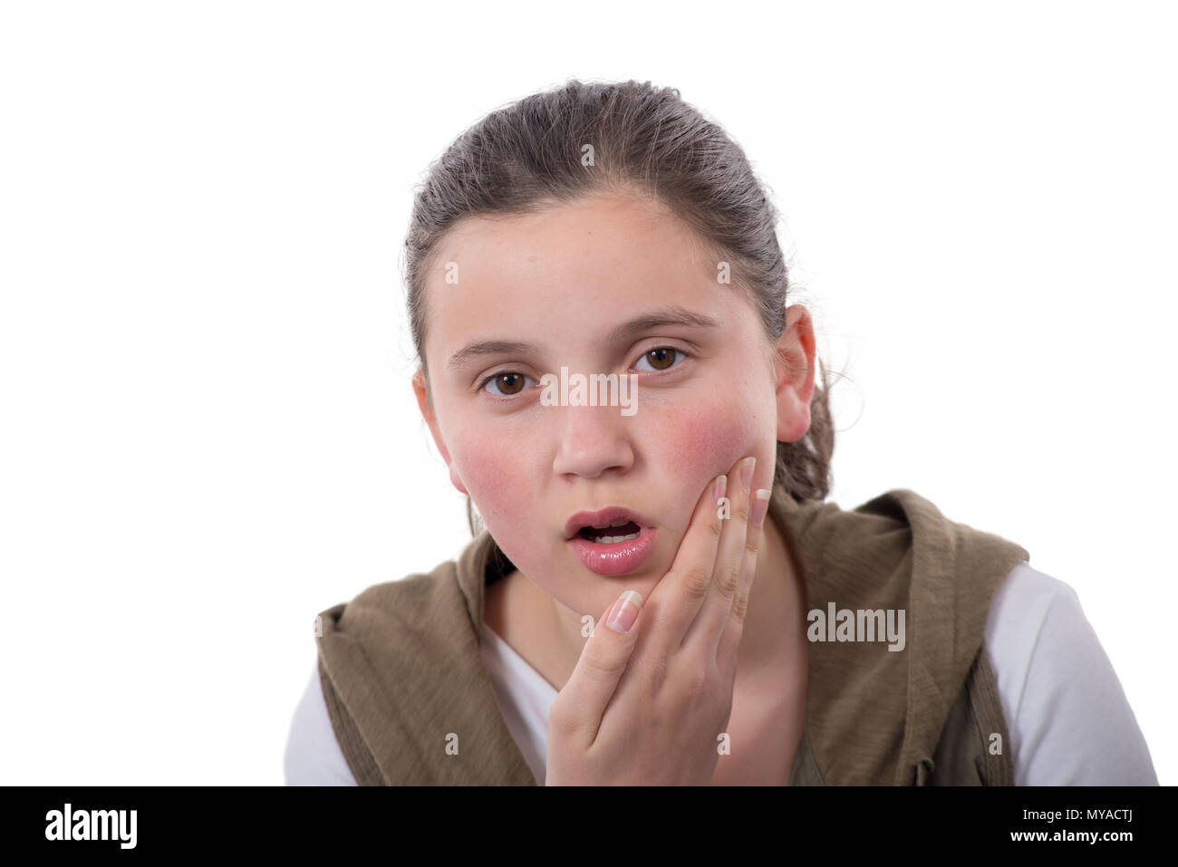 teenage girl has a toothache isolated on a white background Stock Photo ...