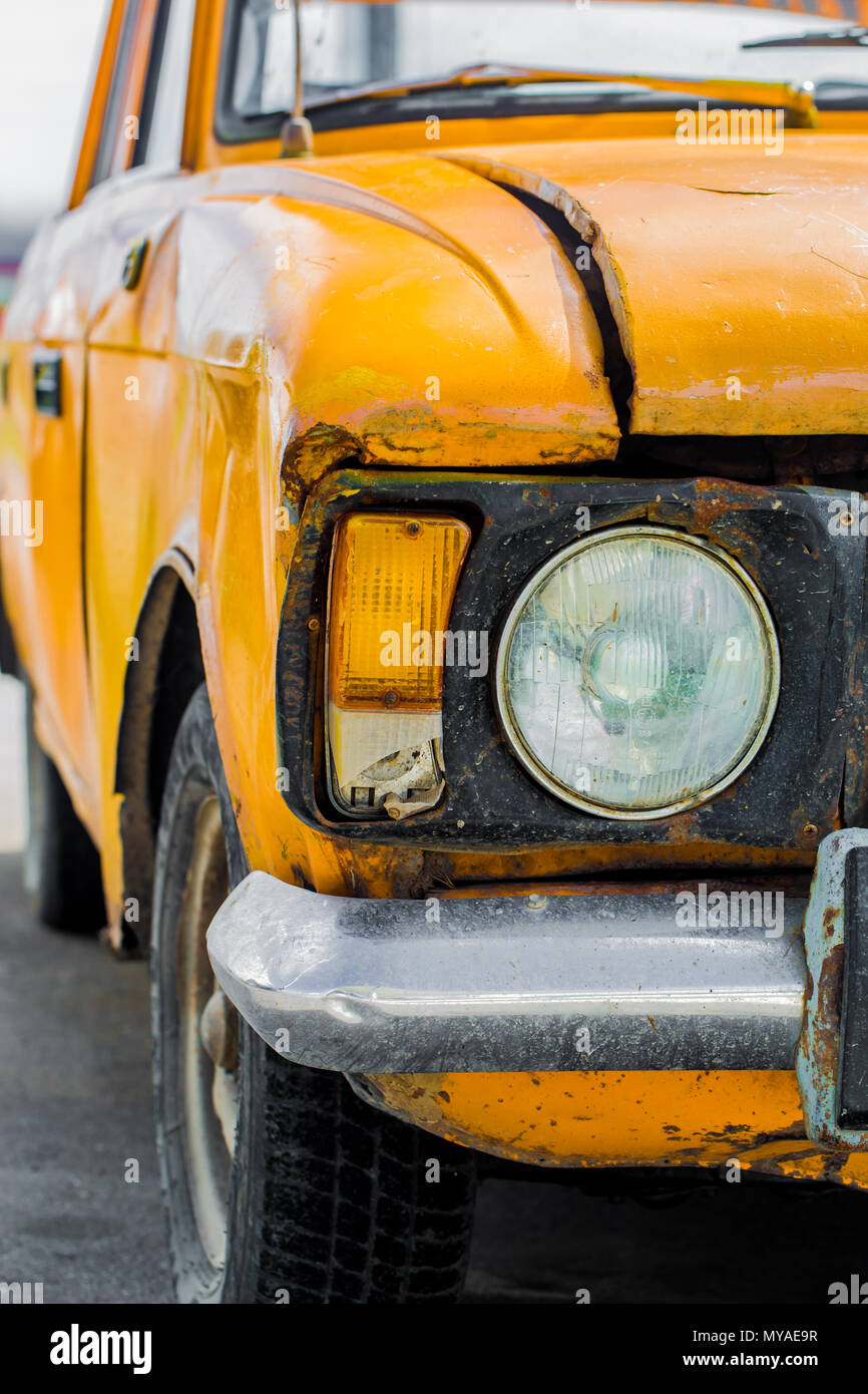 Vintage car yellow. Close up. Muscovite Broken Stock Photo - Alamy