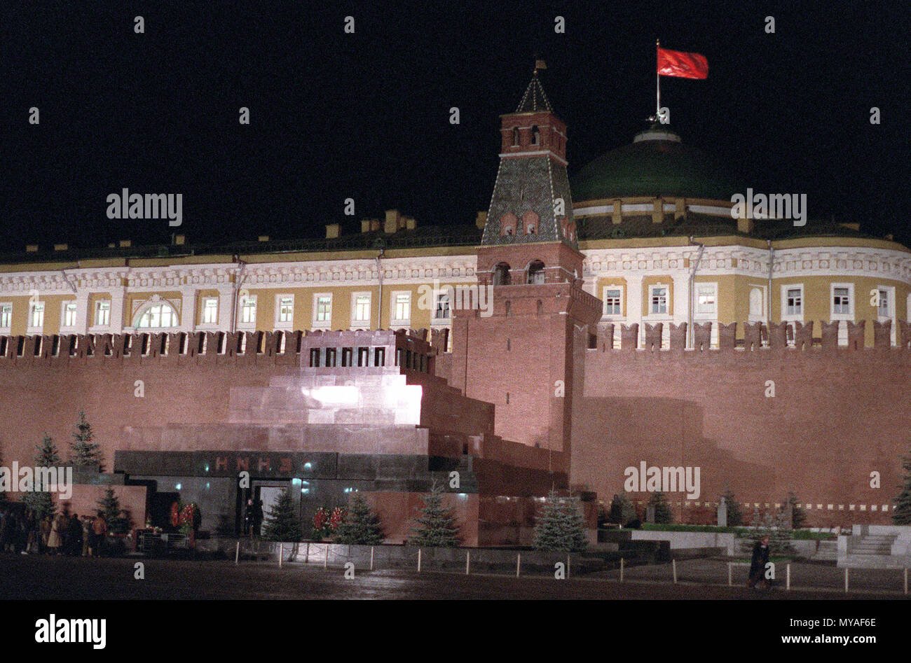 A nighttime view in Red Square showing the Lenin Mausoleum. Behind the ...