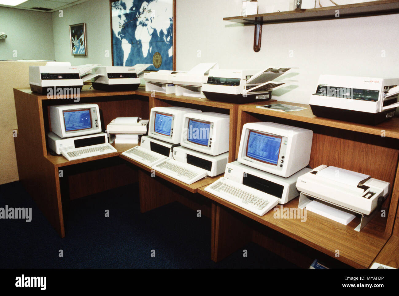 A view of computer stations, printers and facsimile machines that are ...
