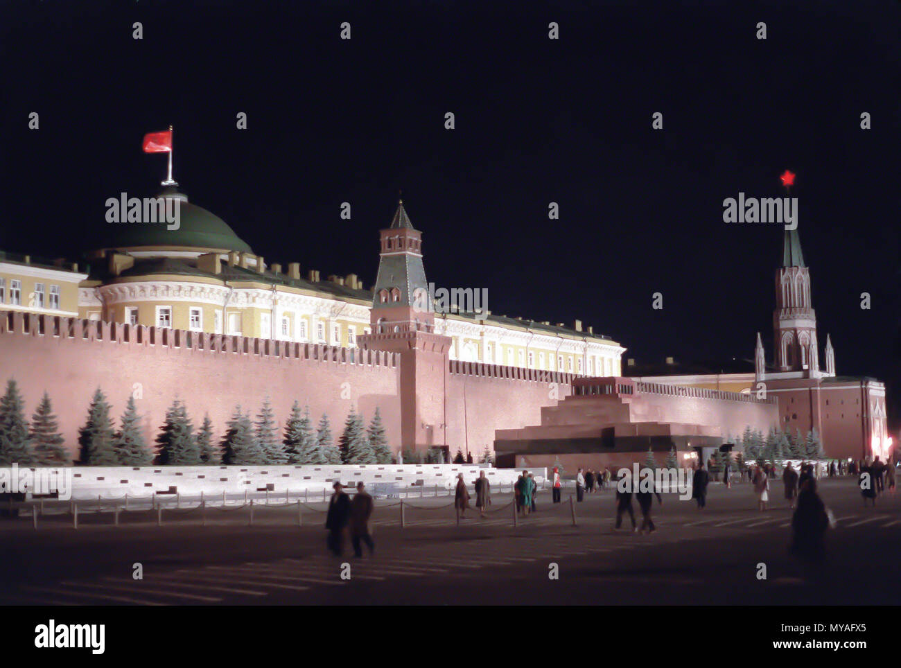 A nighttime view in Red Square showing the Lenin Mausoleum. Behind the ...