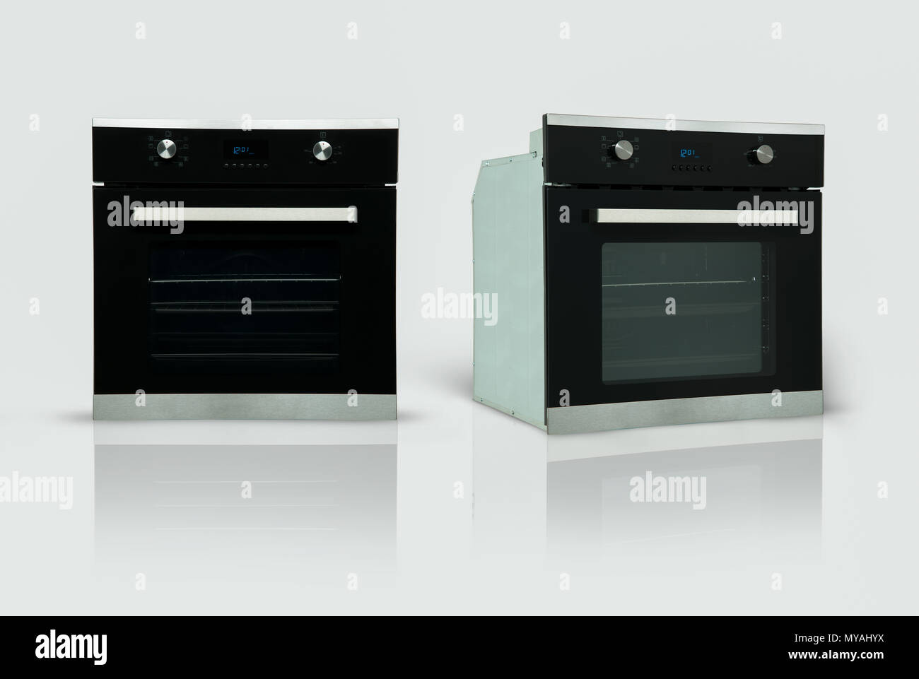 a modern kitchen oven in two positions on a white background. kitchen ...