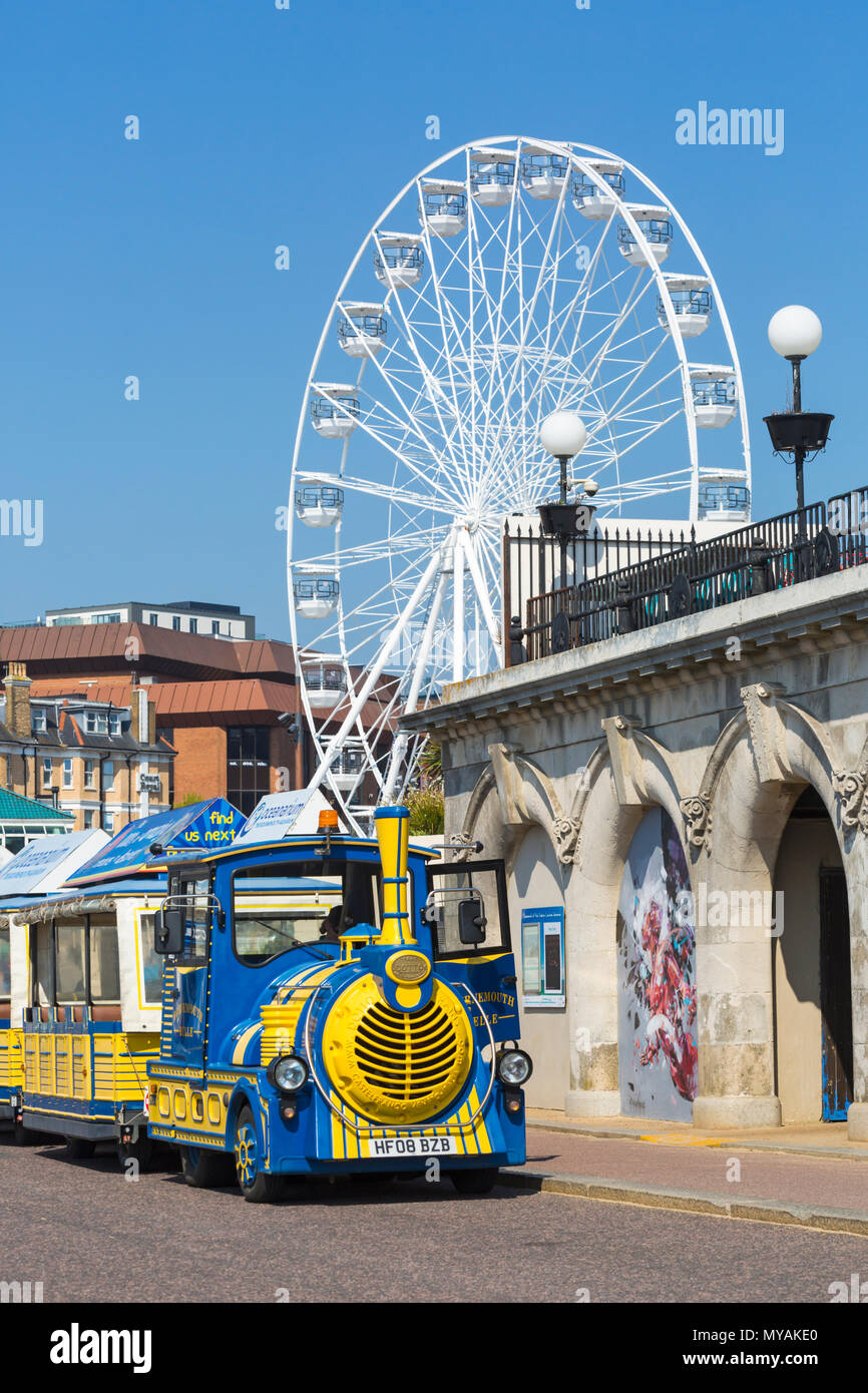 Bournemouth Belle landtrain on promenade with Big Wheel at Pier ...
