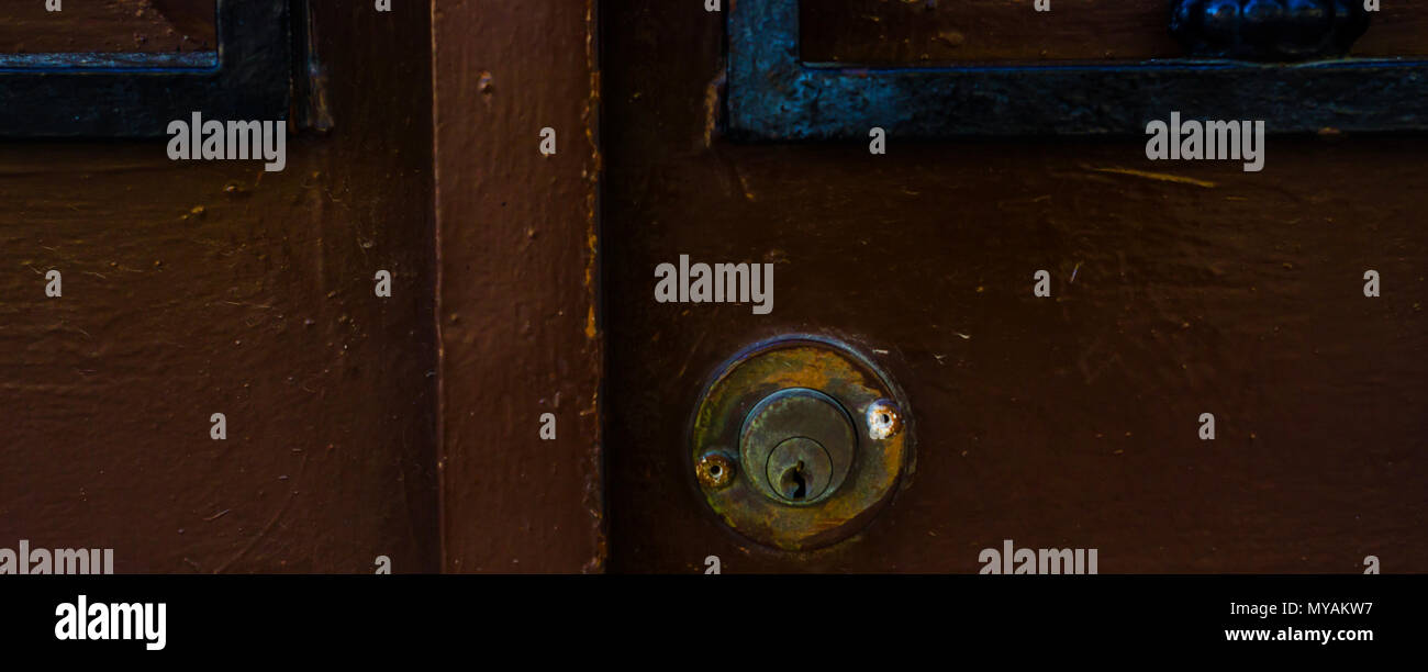 old door lock, aged metal door, home security, vintage Stock Photo - Alamy