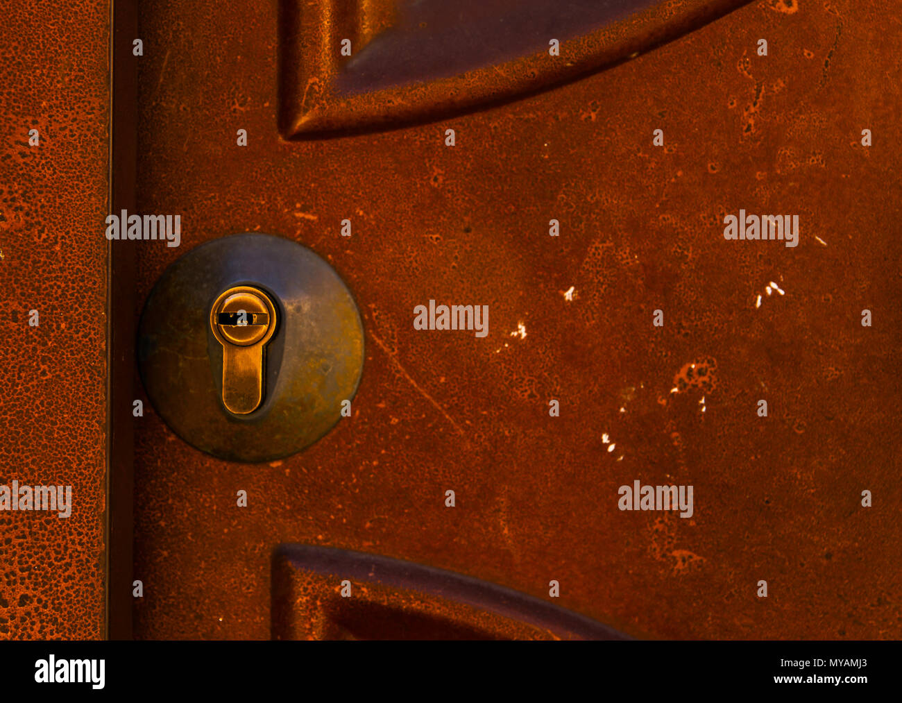 old door lock, aged metal door, home security, vintage Stock Photo - Alamy