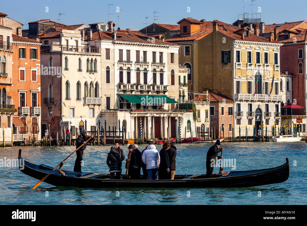 A Traditional Traghetto Gondola Takes Passengers Across The Grand Canal ...